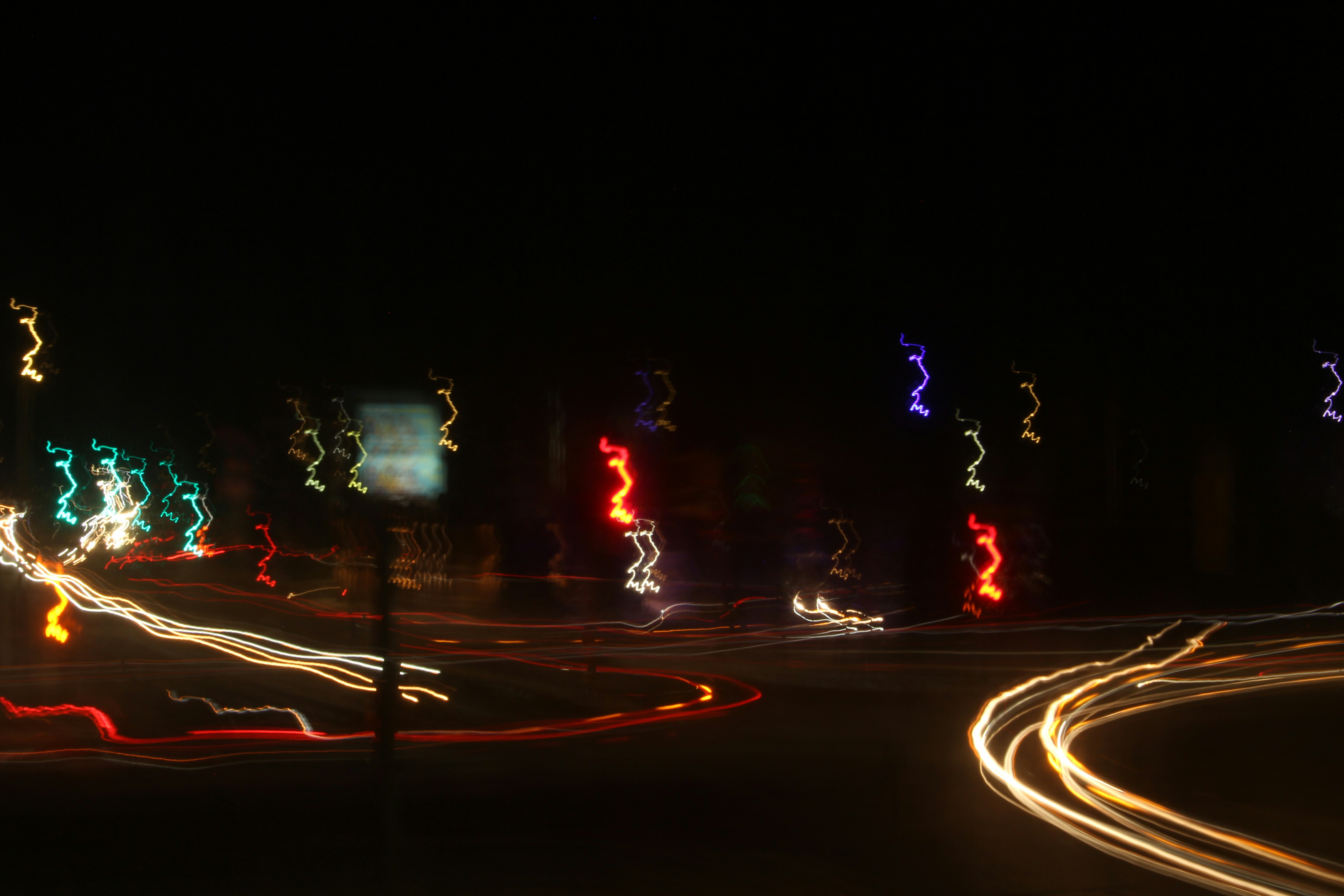 Neon Whorls: Night Traffic Traces with a Wandering Lens