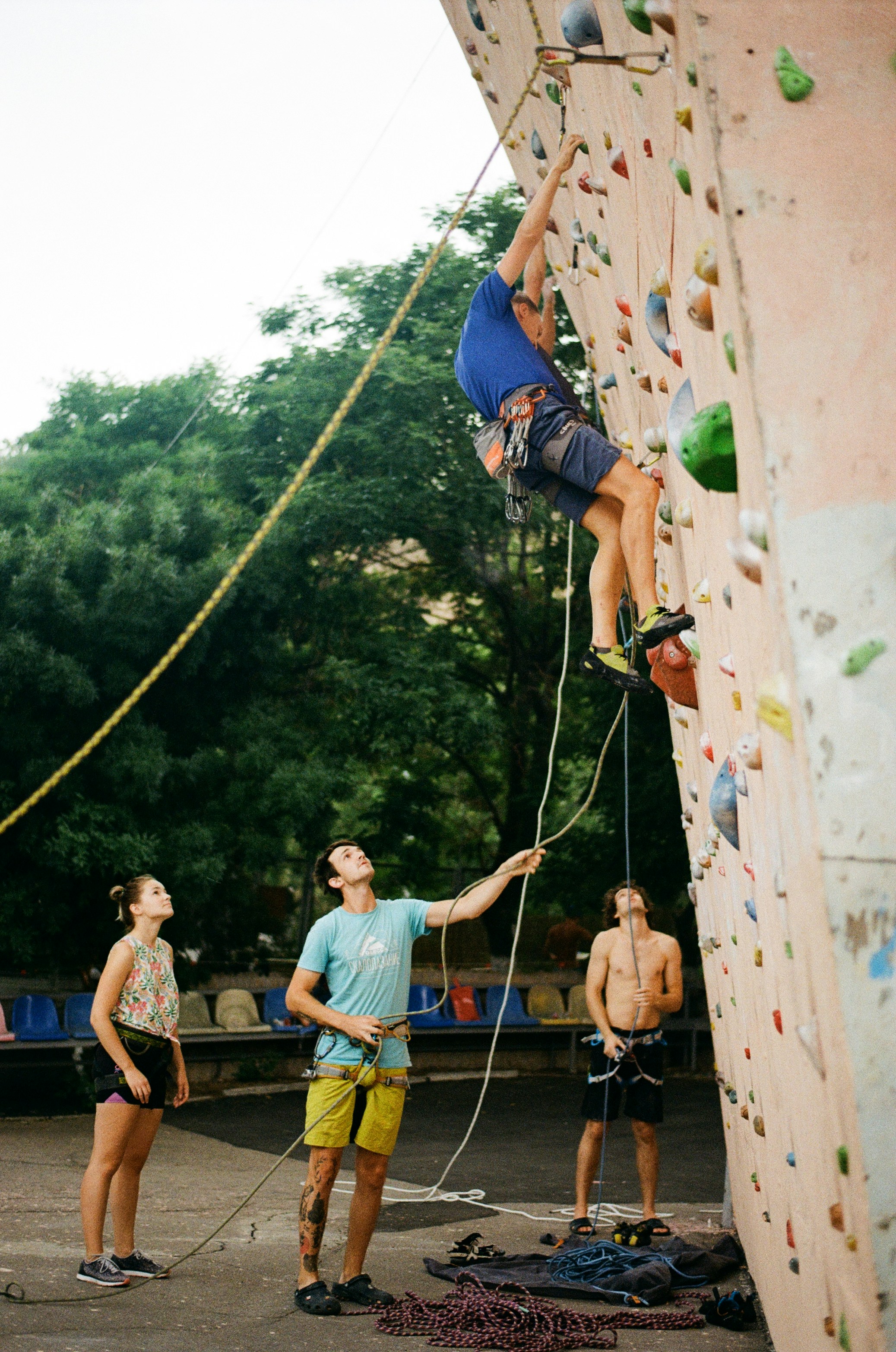 A group of people climbing a rock wall photo – Free Odessa Image on ...