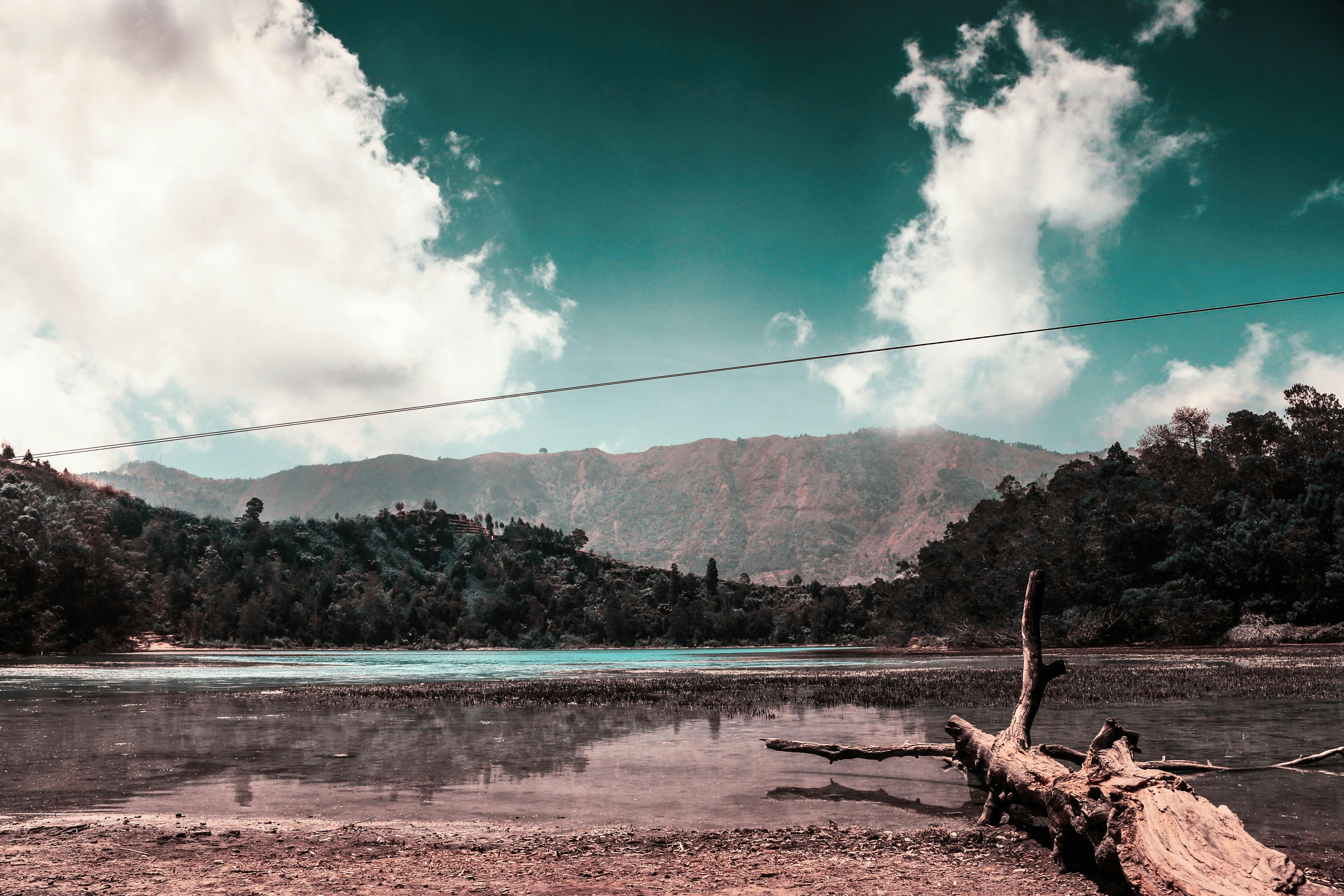 Ethereal Skies Over Twin-Colored Lake