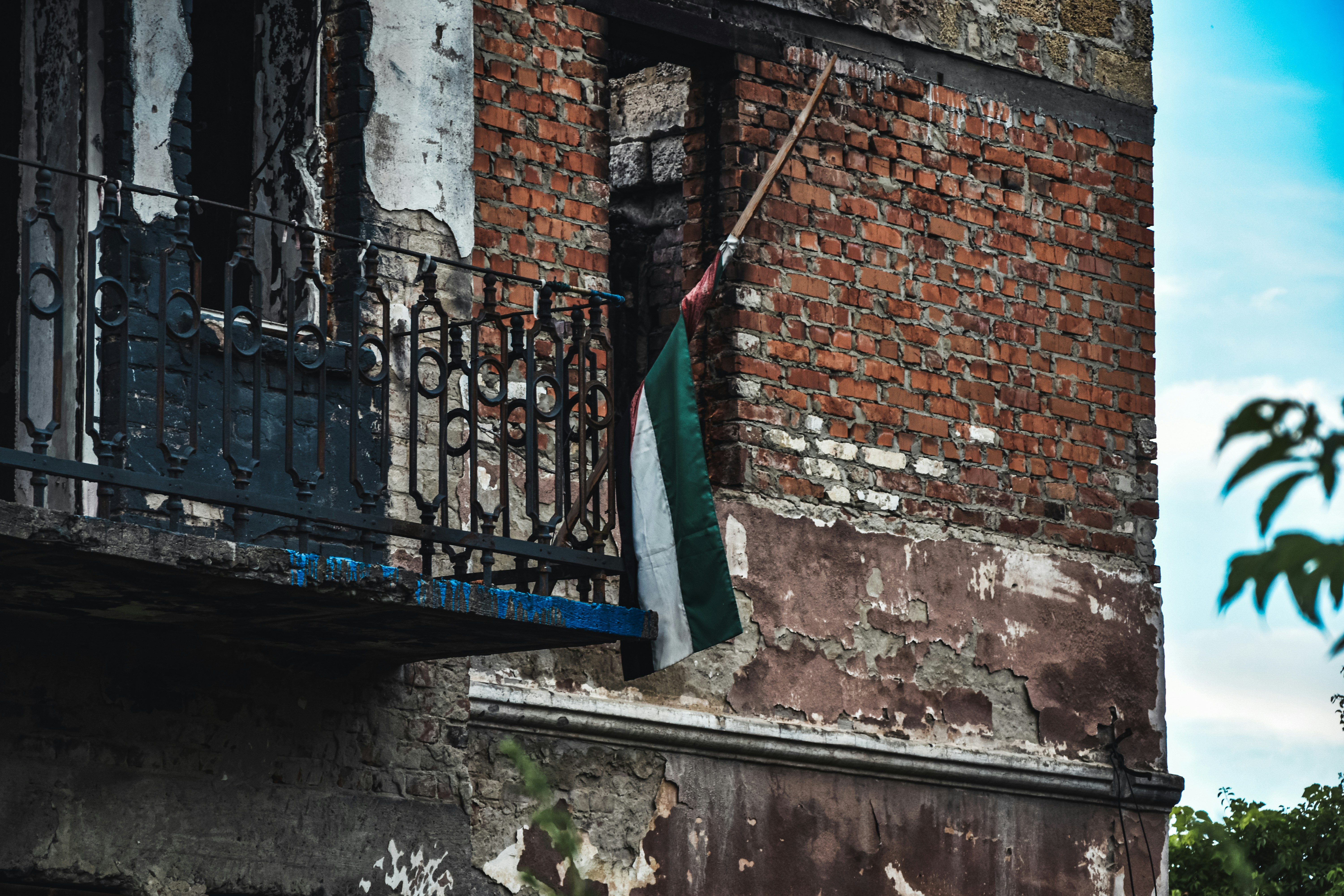 a flag on a brick wall