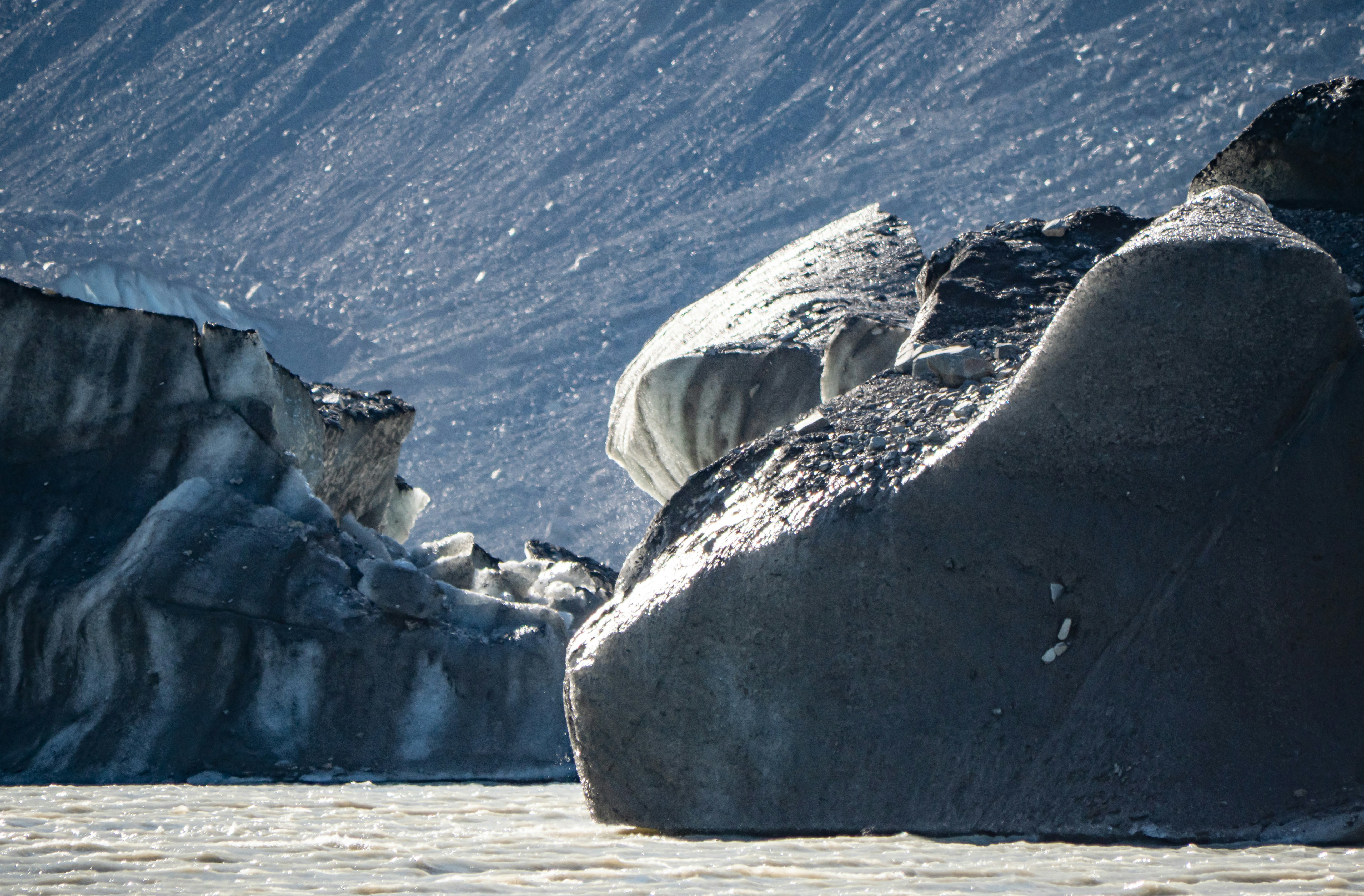 Icebound Monolith at Dusk: Weathered Granite Meets Glacial Light