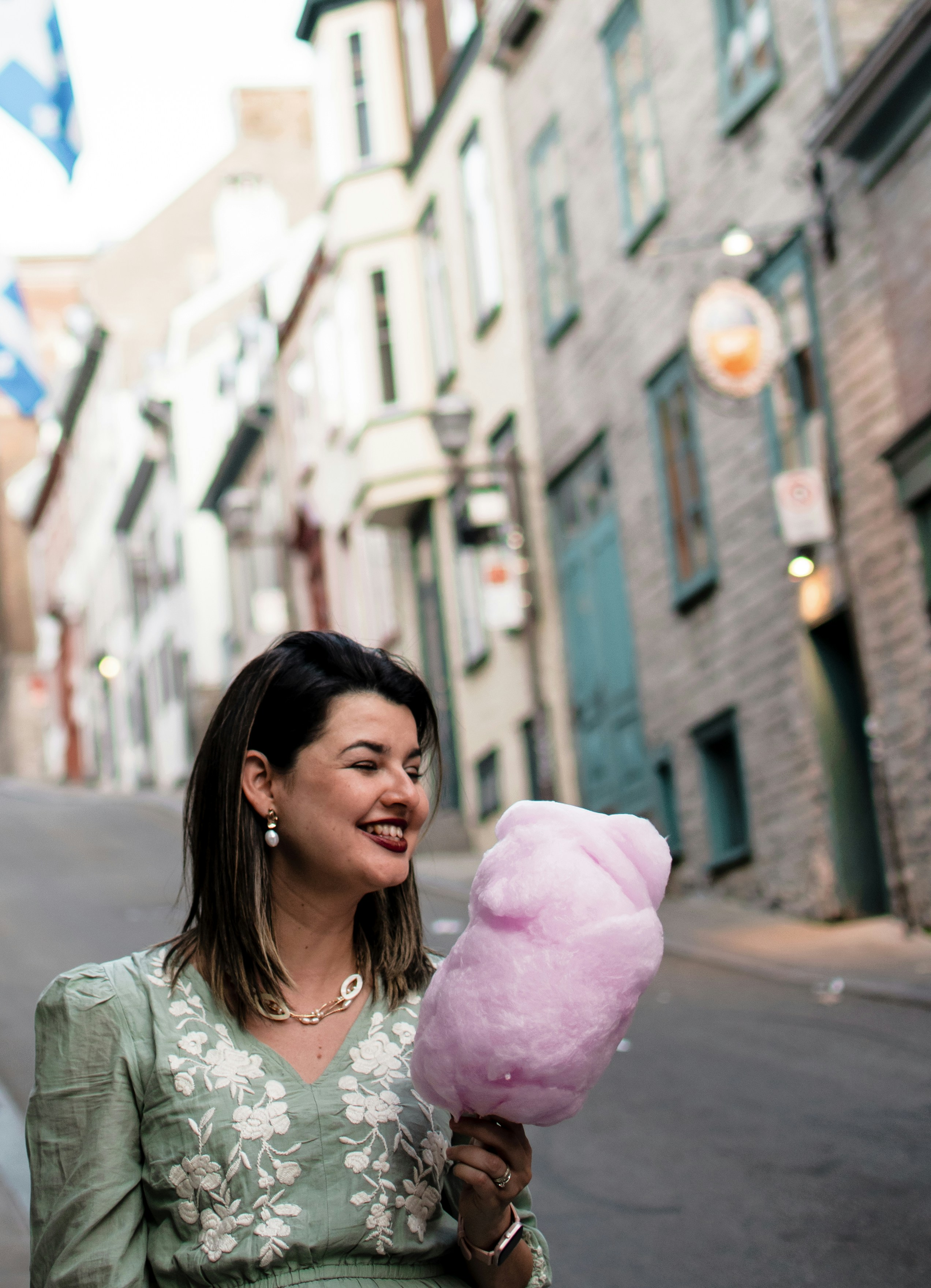 A woman holding a pink balloon photo – Free Quebec city area Image on ...