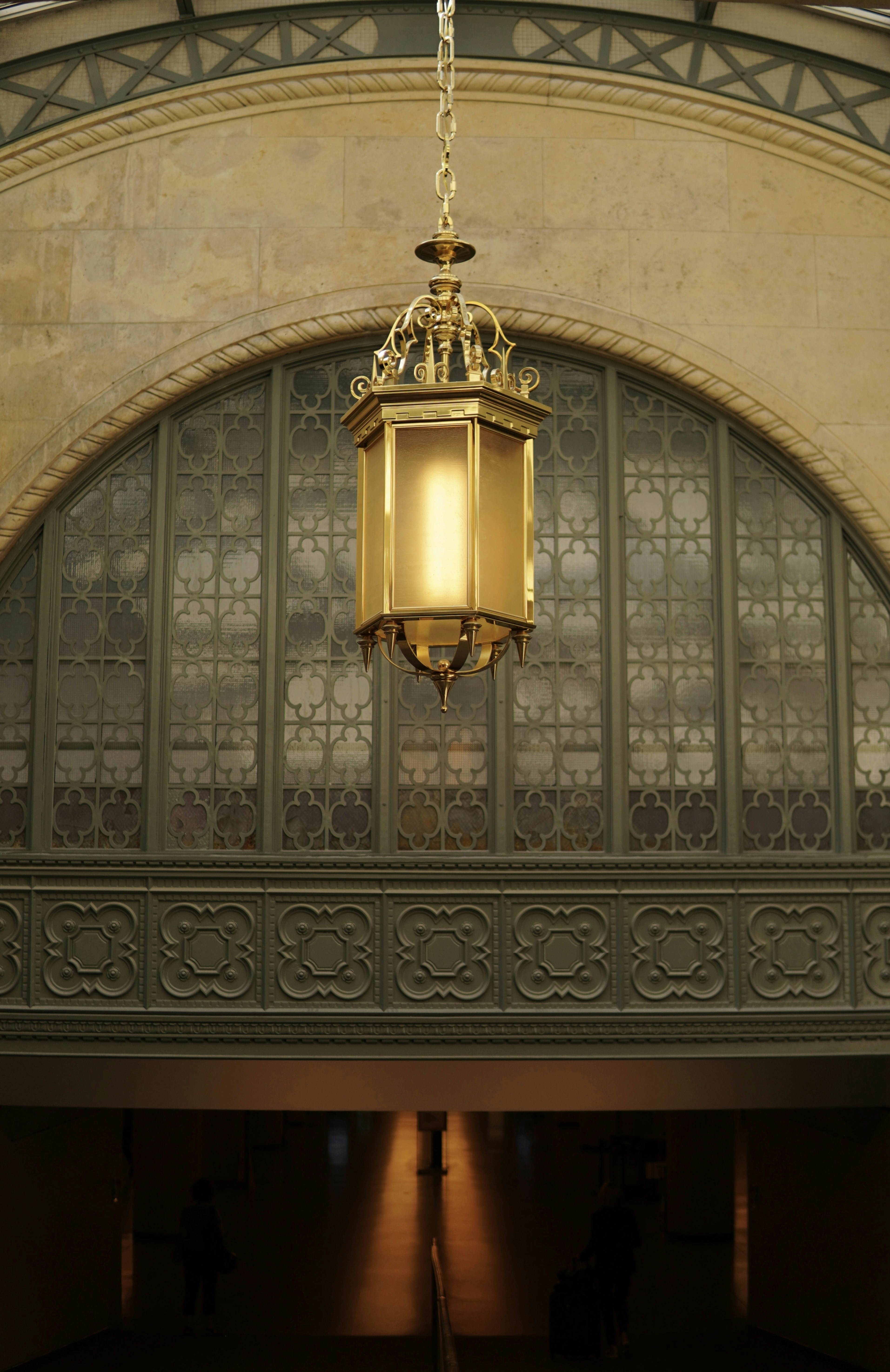 Golden Lantern in the Archway: Quiet Spotlight of a Historic Hall