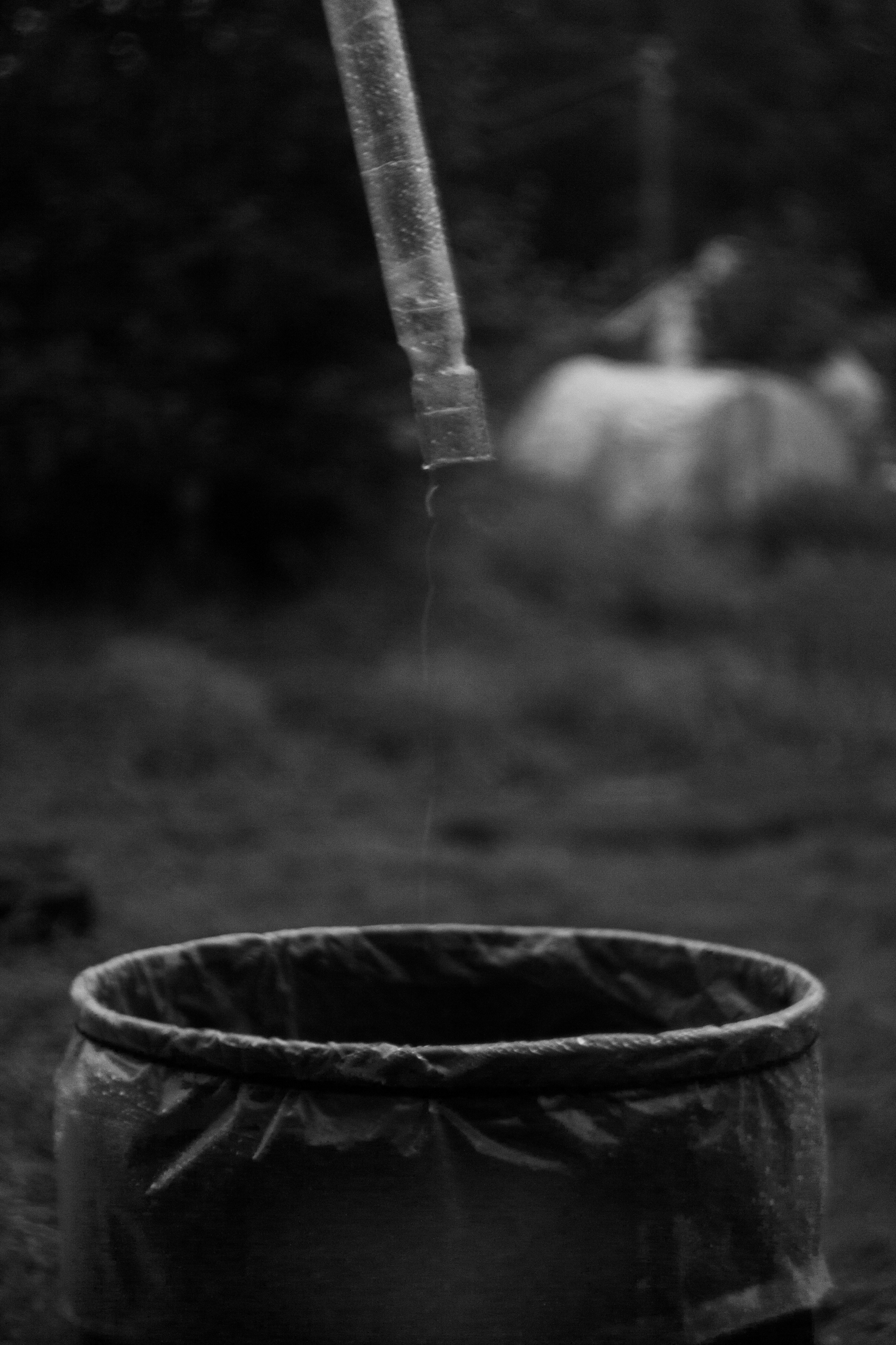 Drip Over the Can: A Monochrome Quiet Moment