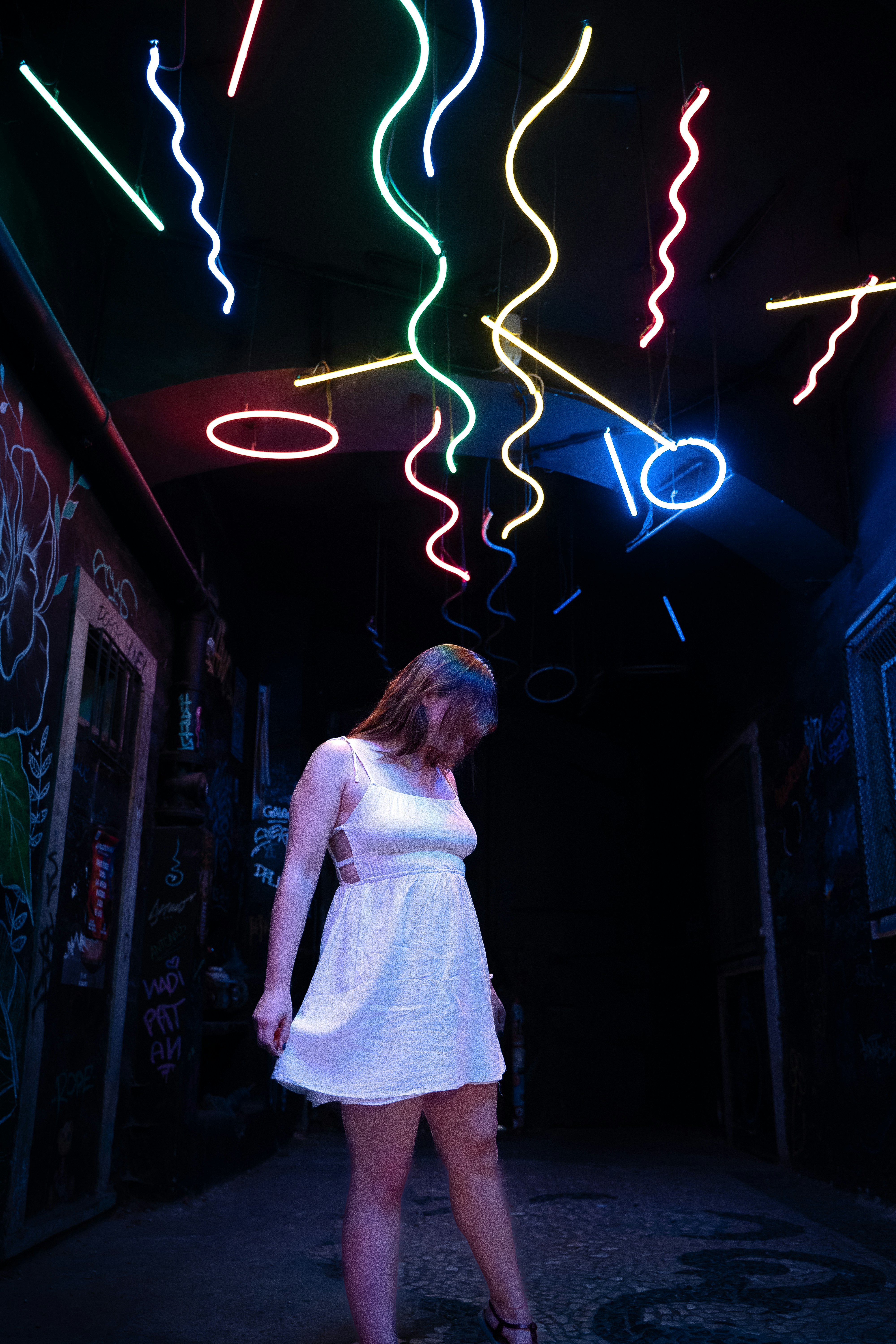 a woman standing in front of a stage