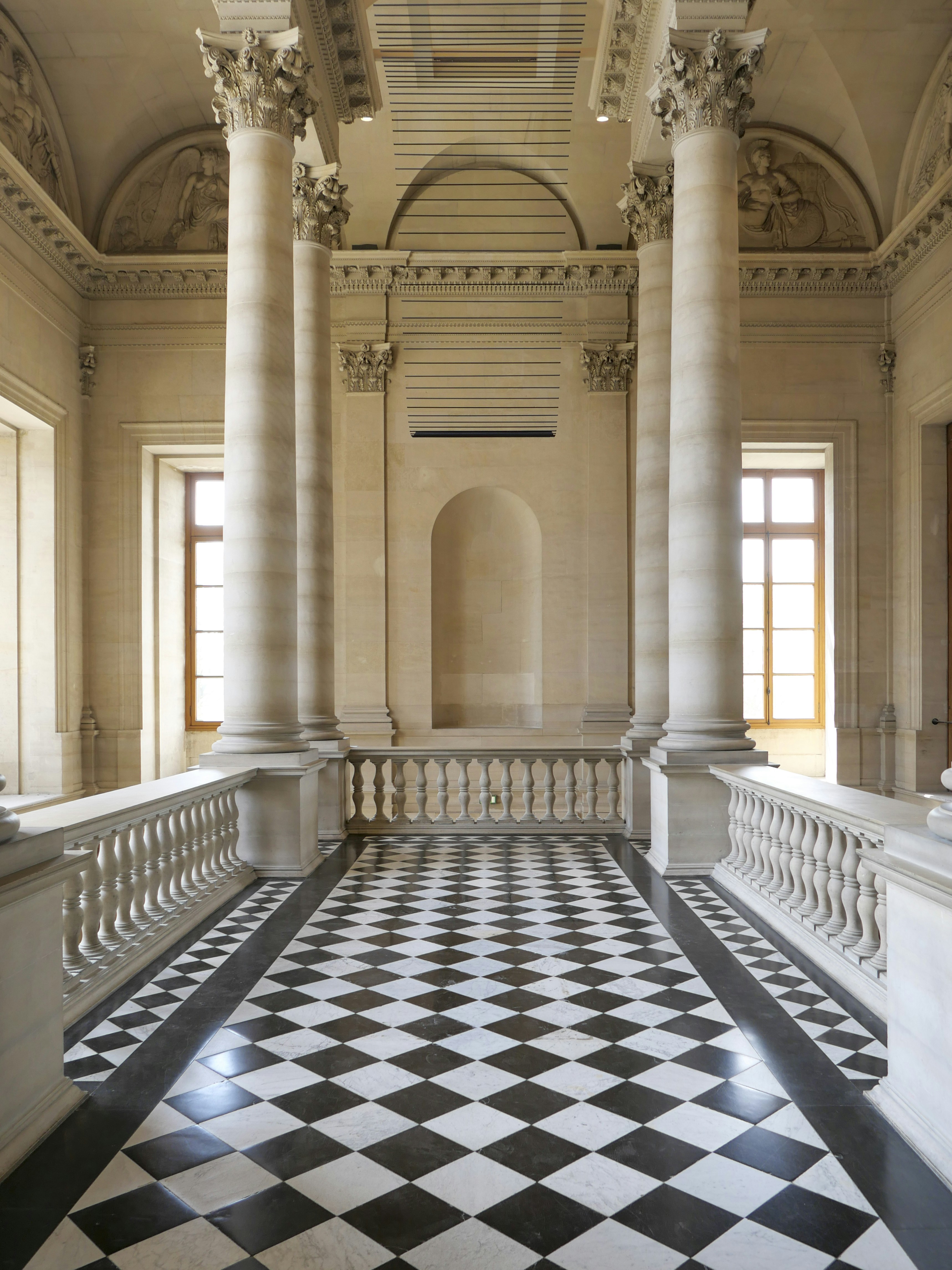 A large room with pillars photo – Free Louvre museum Image on Unsplash