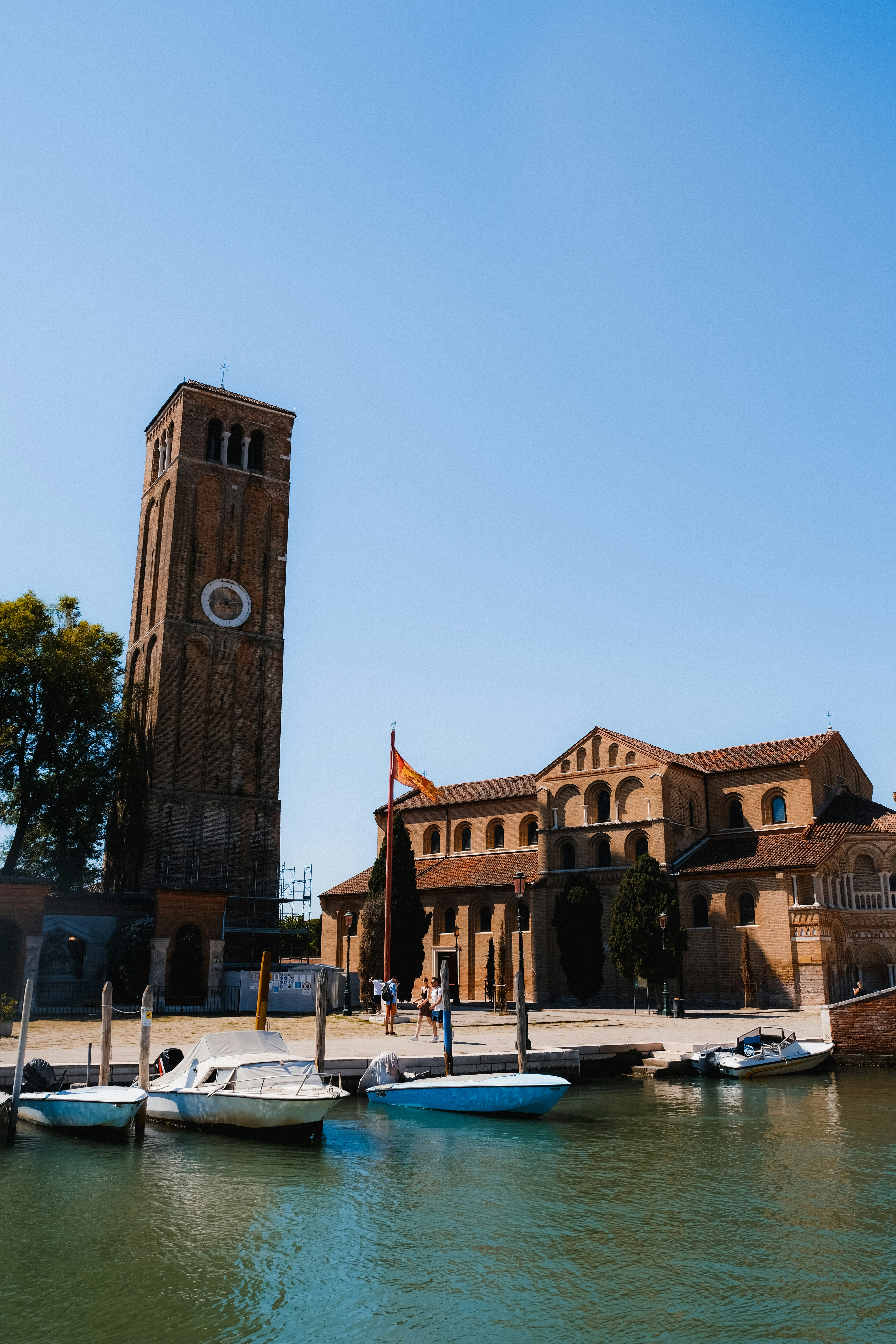 Harbor Clocktower and Brick Campus by Sunset Waters