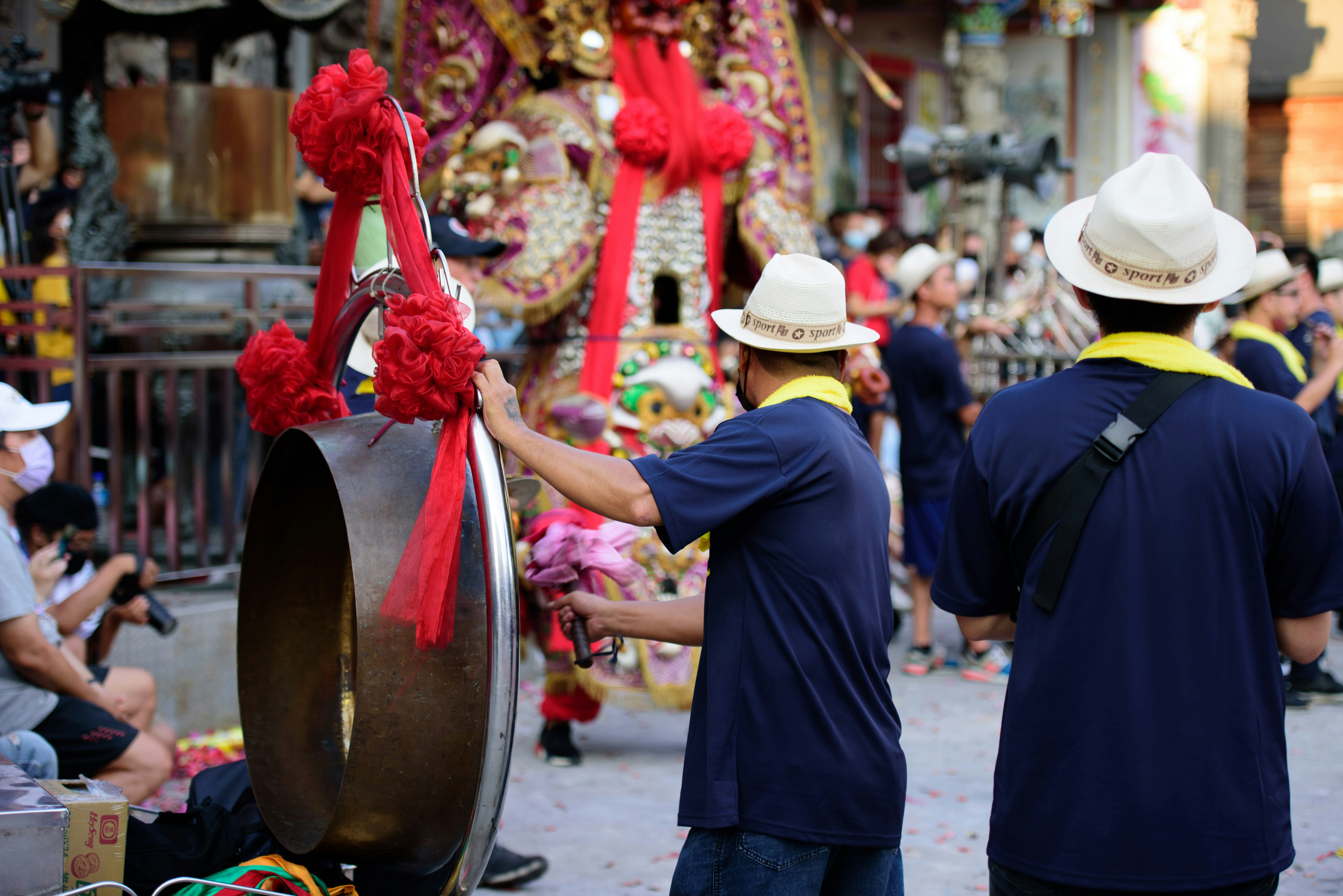 A person holding a large red dragon photo – Free Human Image on Unsplash