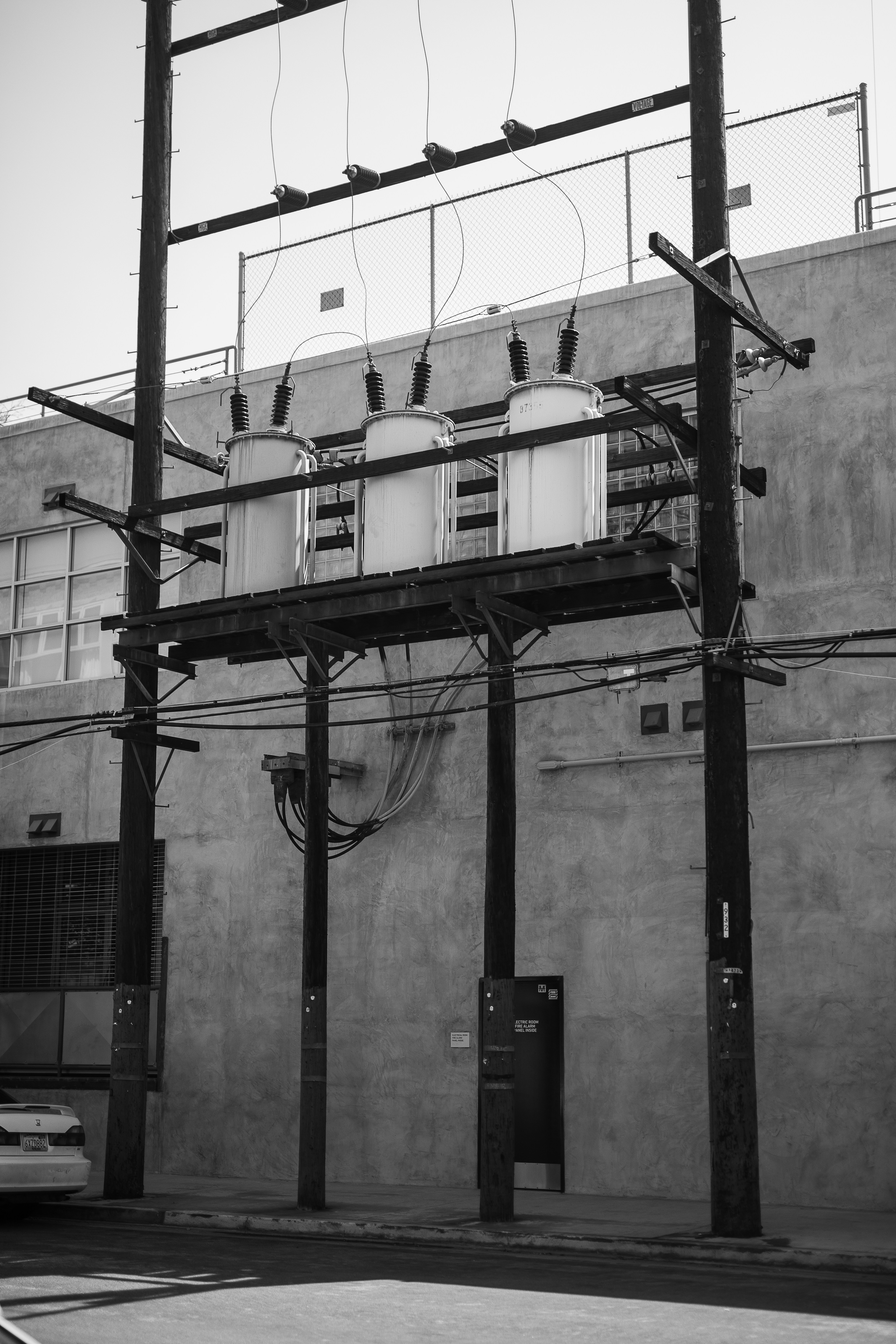 Industrial Grid: Power Lines and Transformers on a Quiet Street