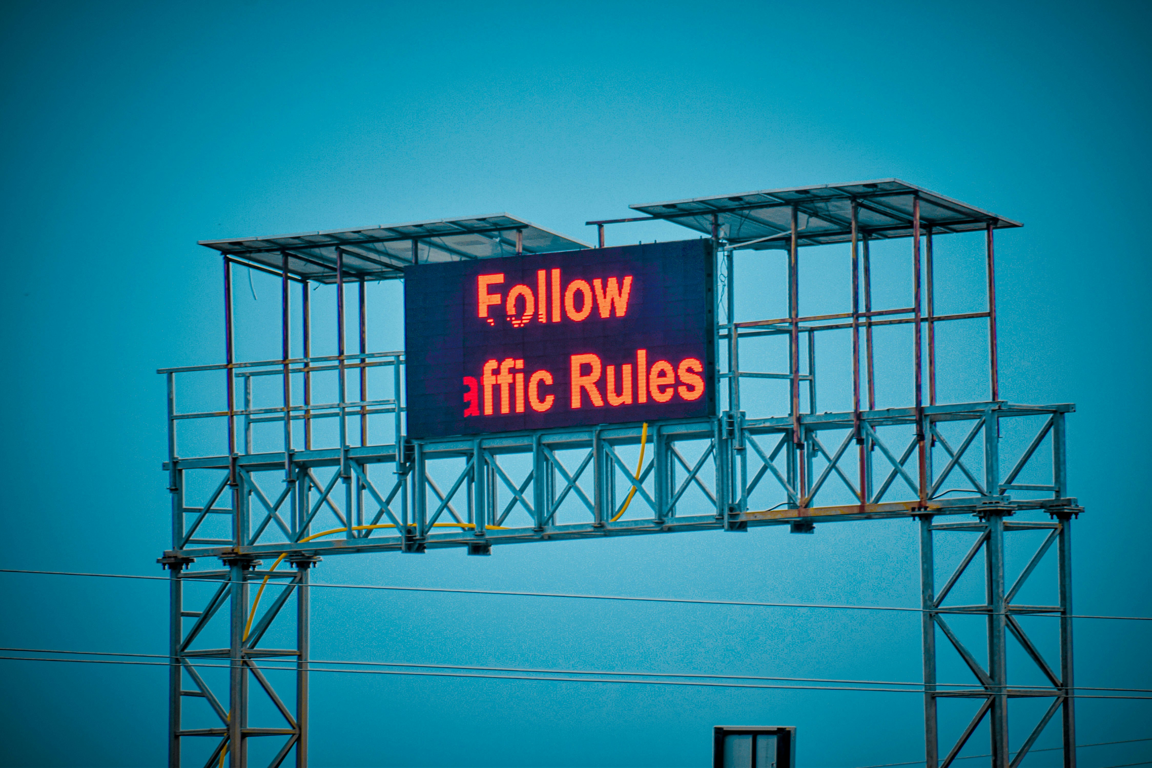 A large blue and red sign photo – Free Highway road Image on Unsplash