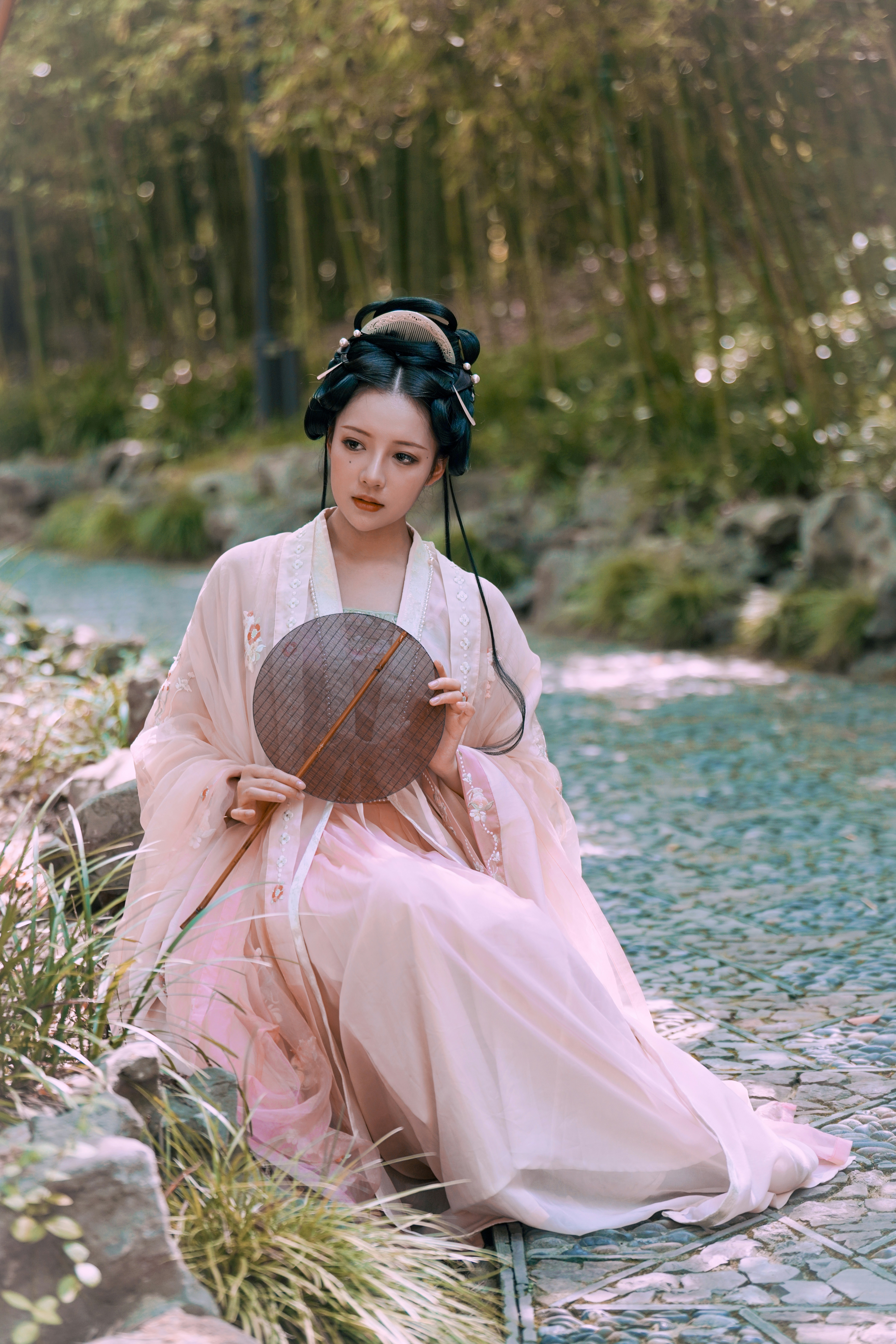 Soft Silk in a Garden Dawn: A Geisha with a Round Fan