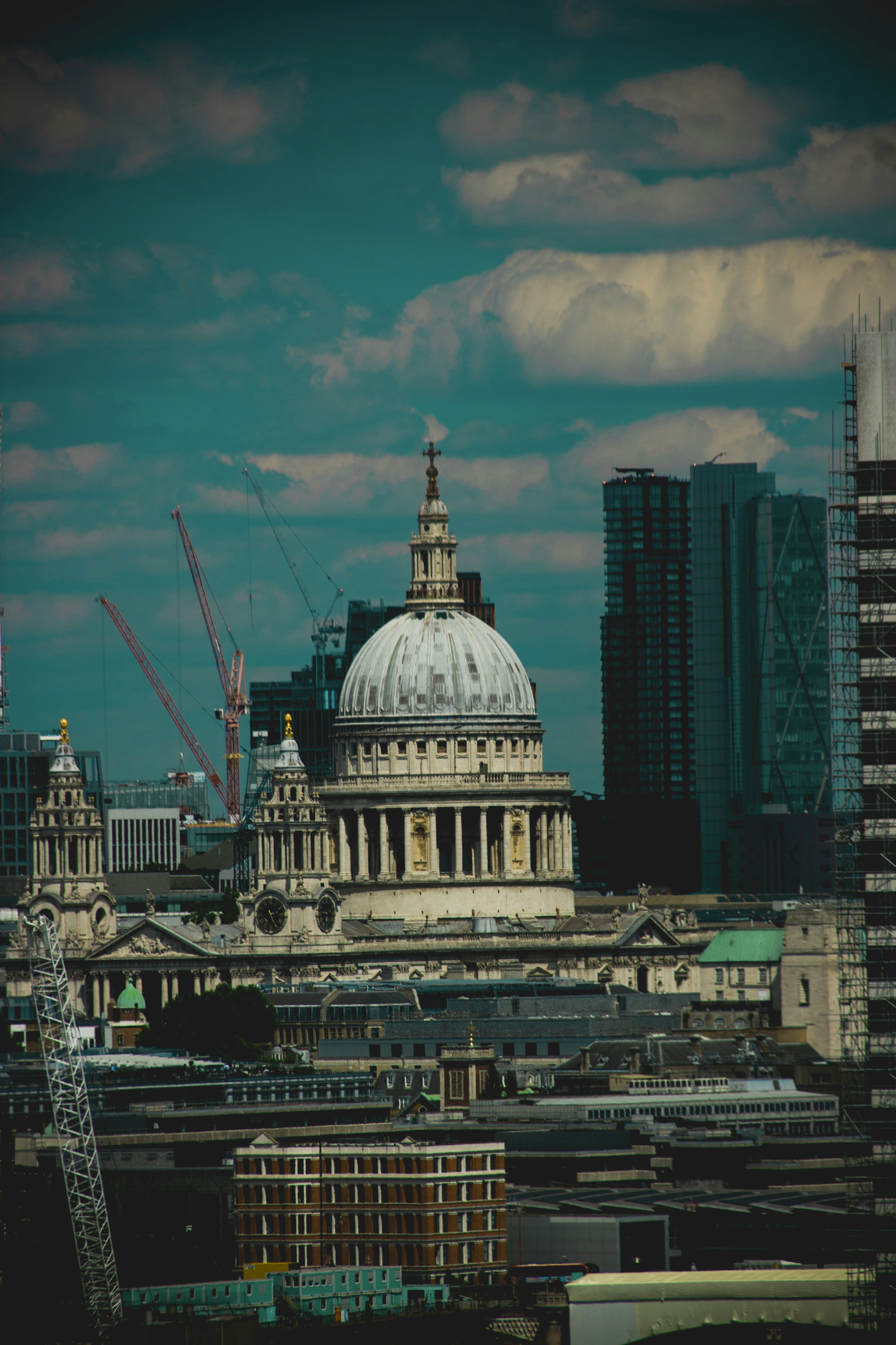 Stately Dome Amid Steel and Sky