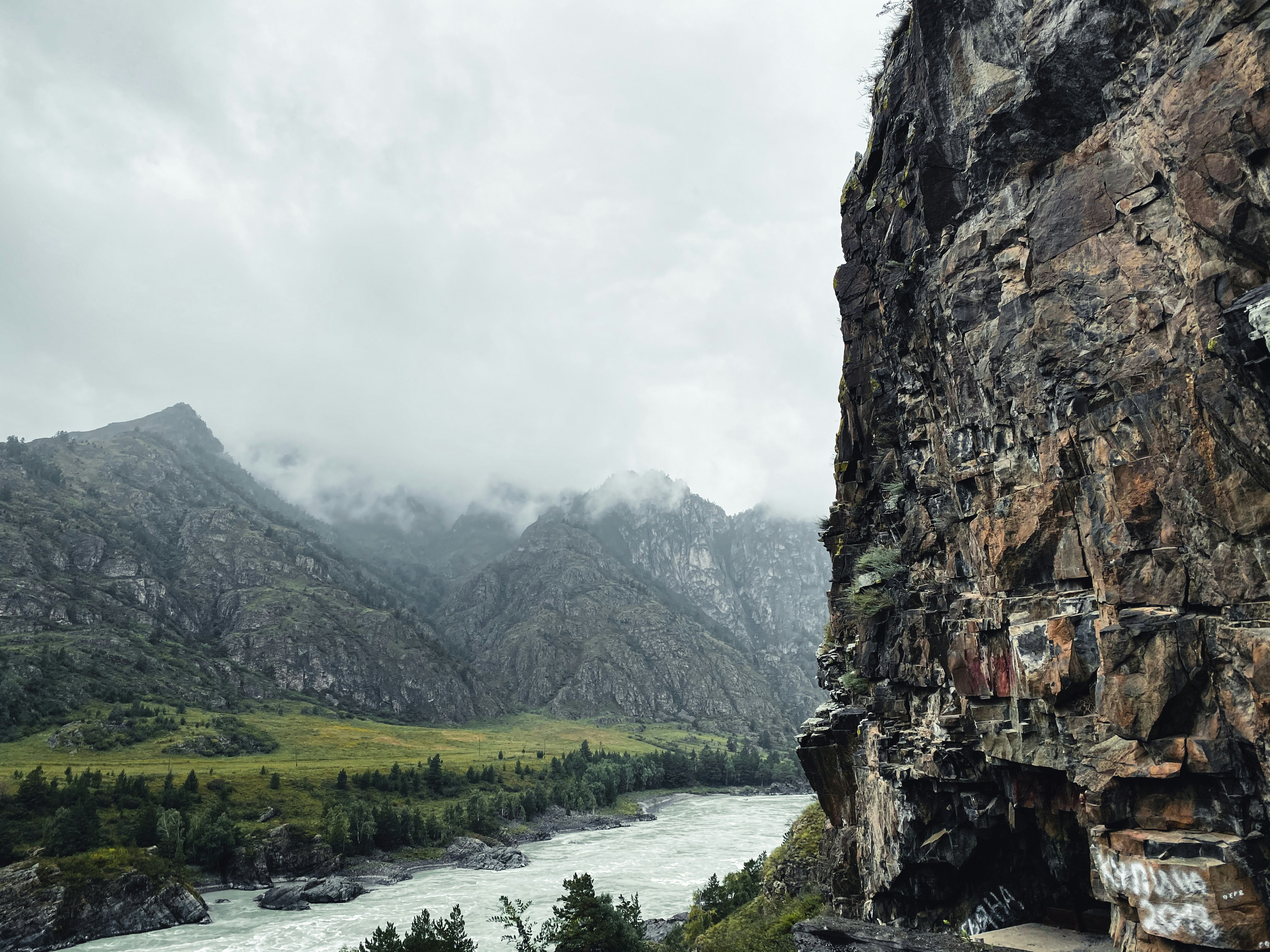 Rugged Gorge Valley: River Cutting Through Between Cliffs