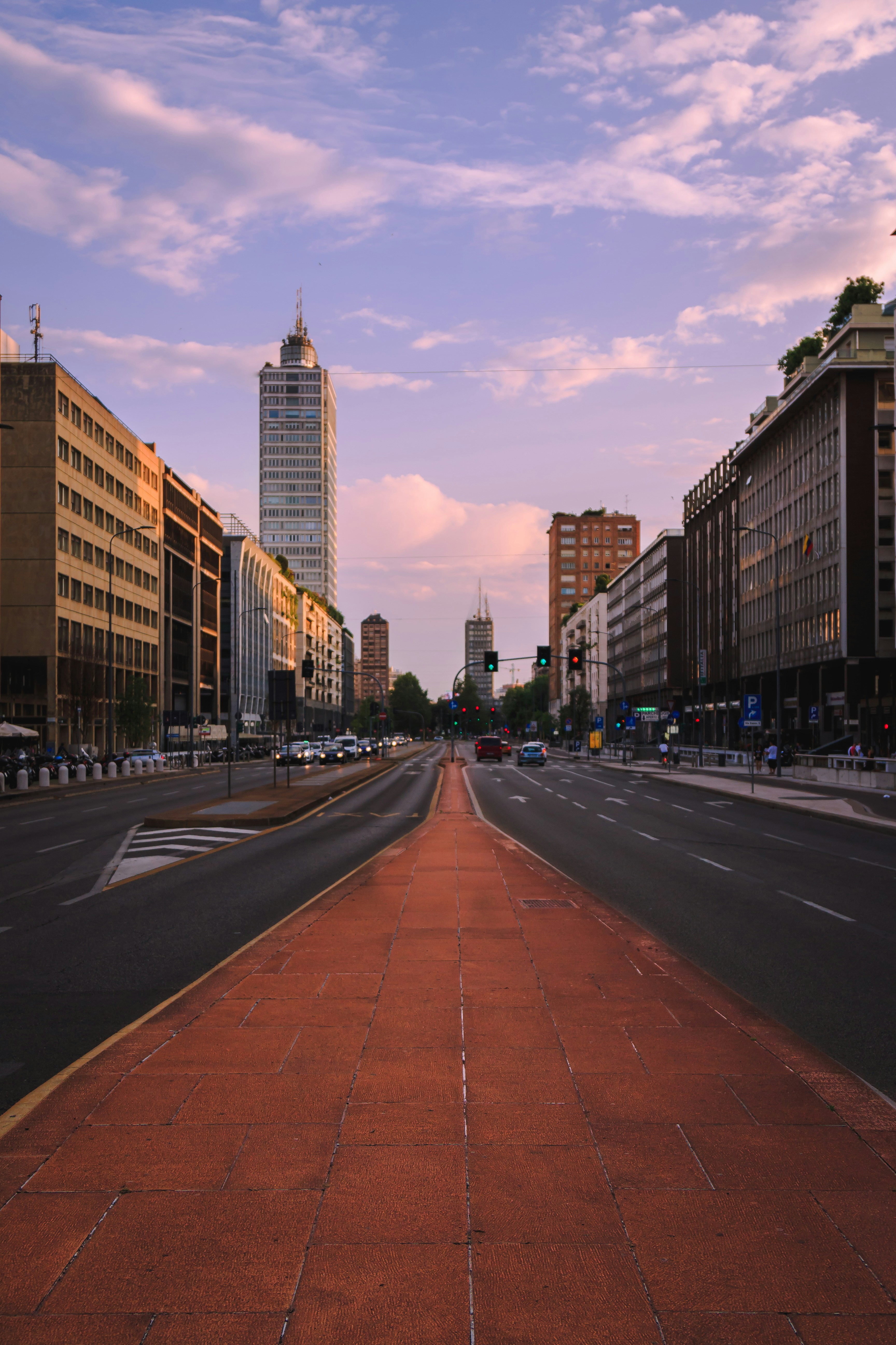 a city street with tall buildingsLuca Nicoletti