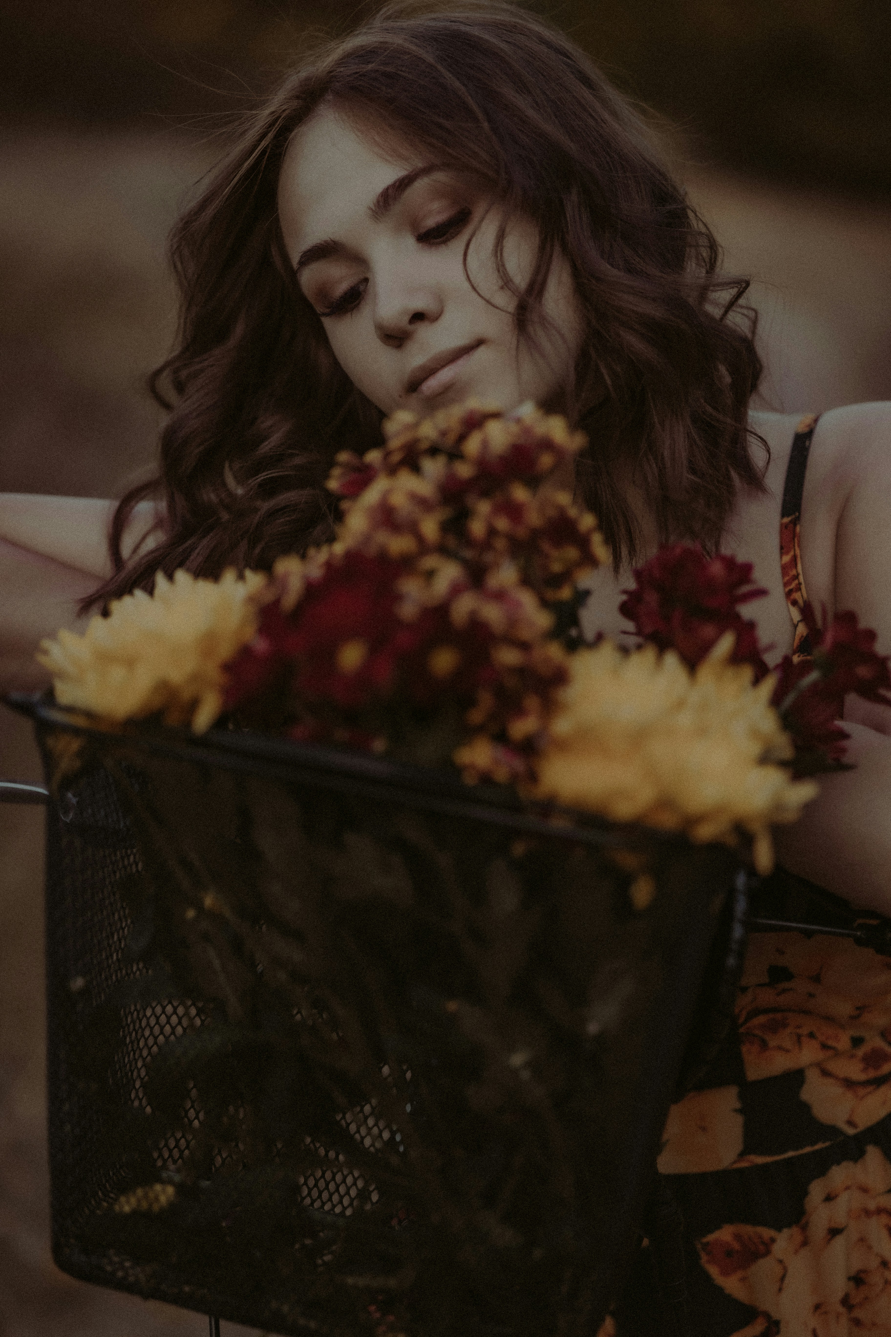 Twilight Quiet: A Portrait Amid Autumn Blooms
