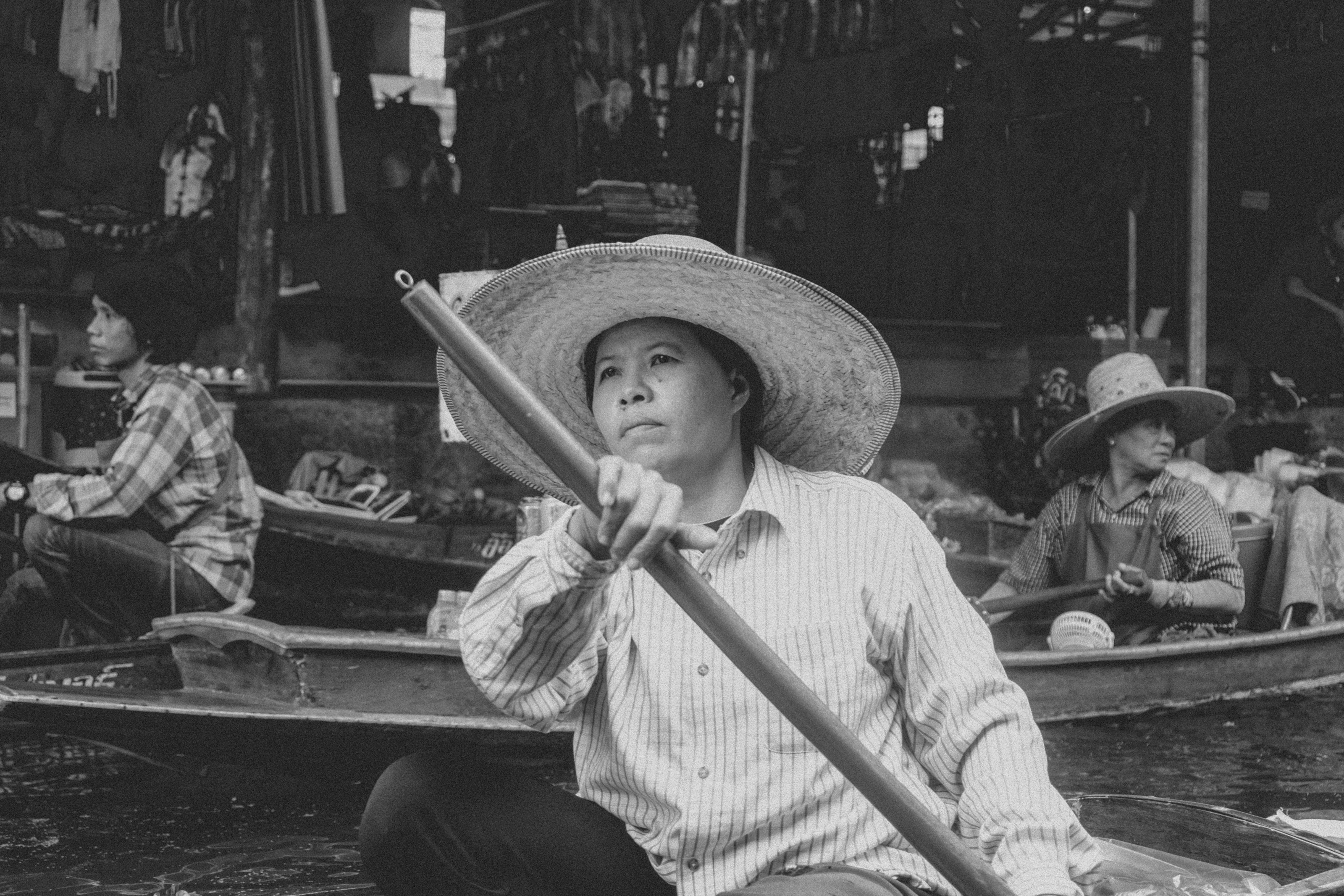 Oars and Steam: A Woman Navigates the Channel in a Straw Hat