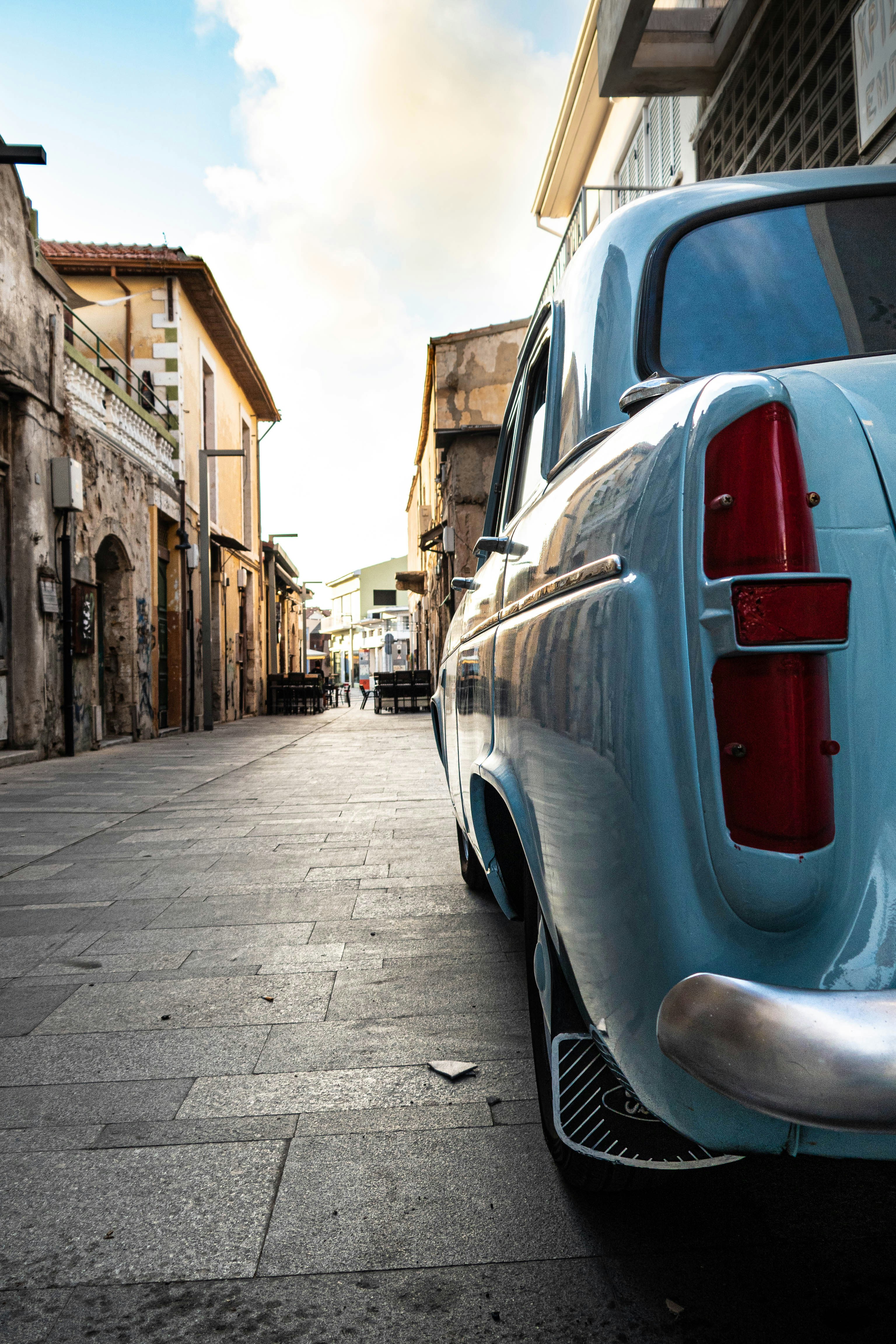 Blue Classic on a Sunlit Calle