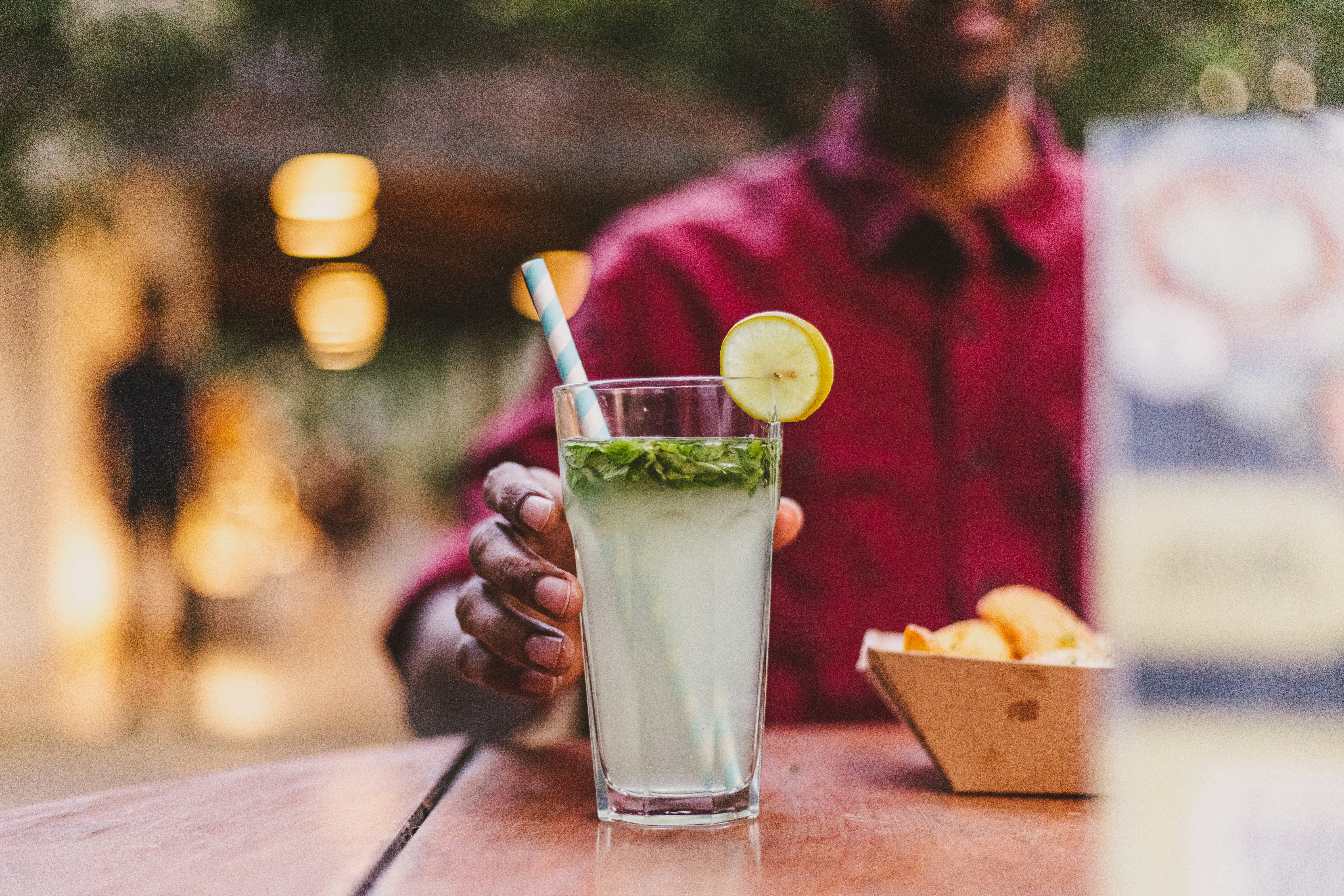 Mint Mojito in Focus at a Sunlit Café Table