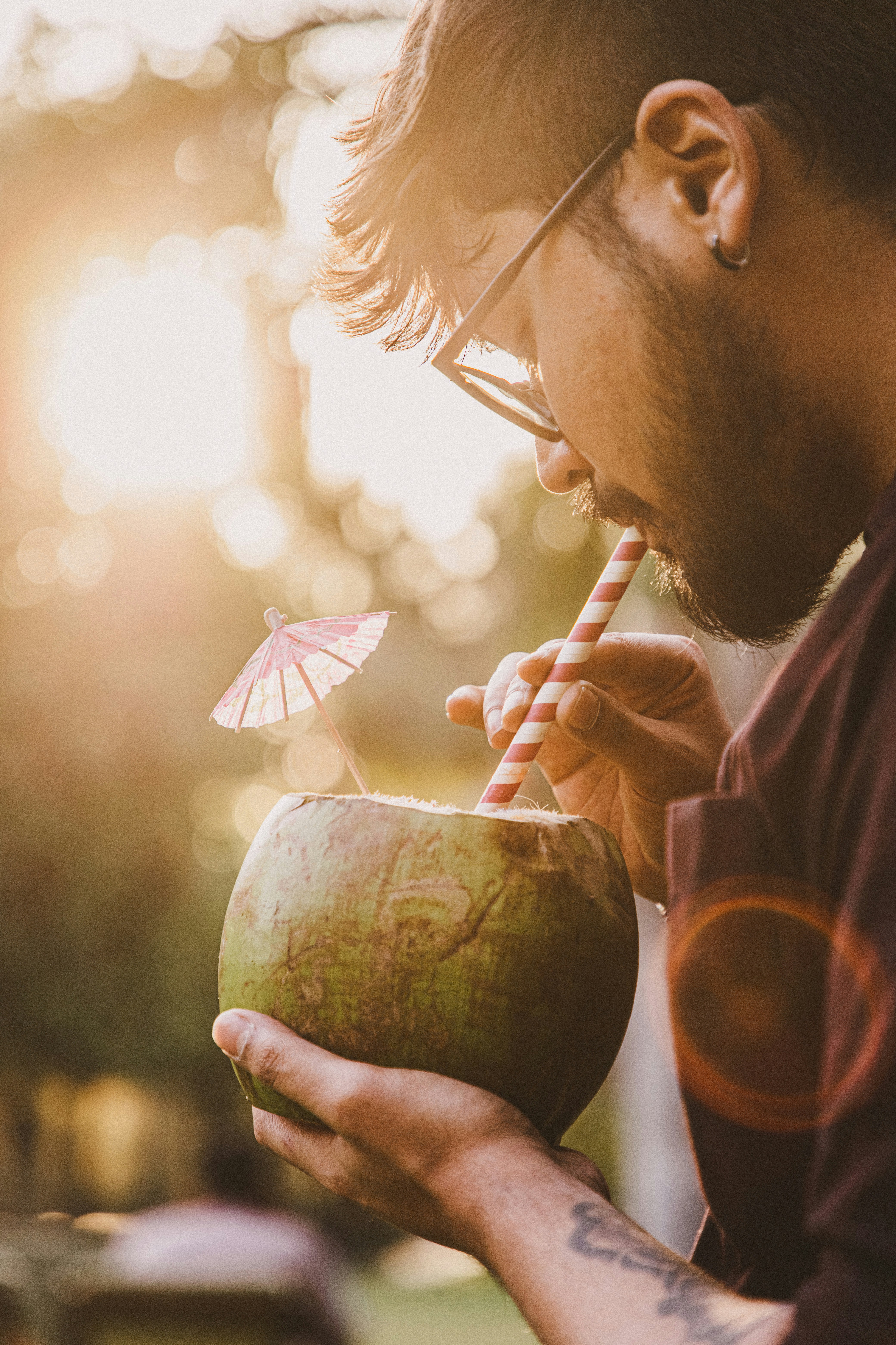 A man drinking from a straw photo – Free Plant Image on Unsplash