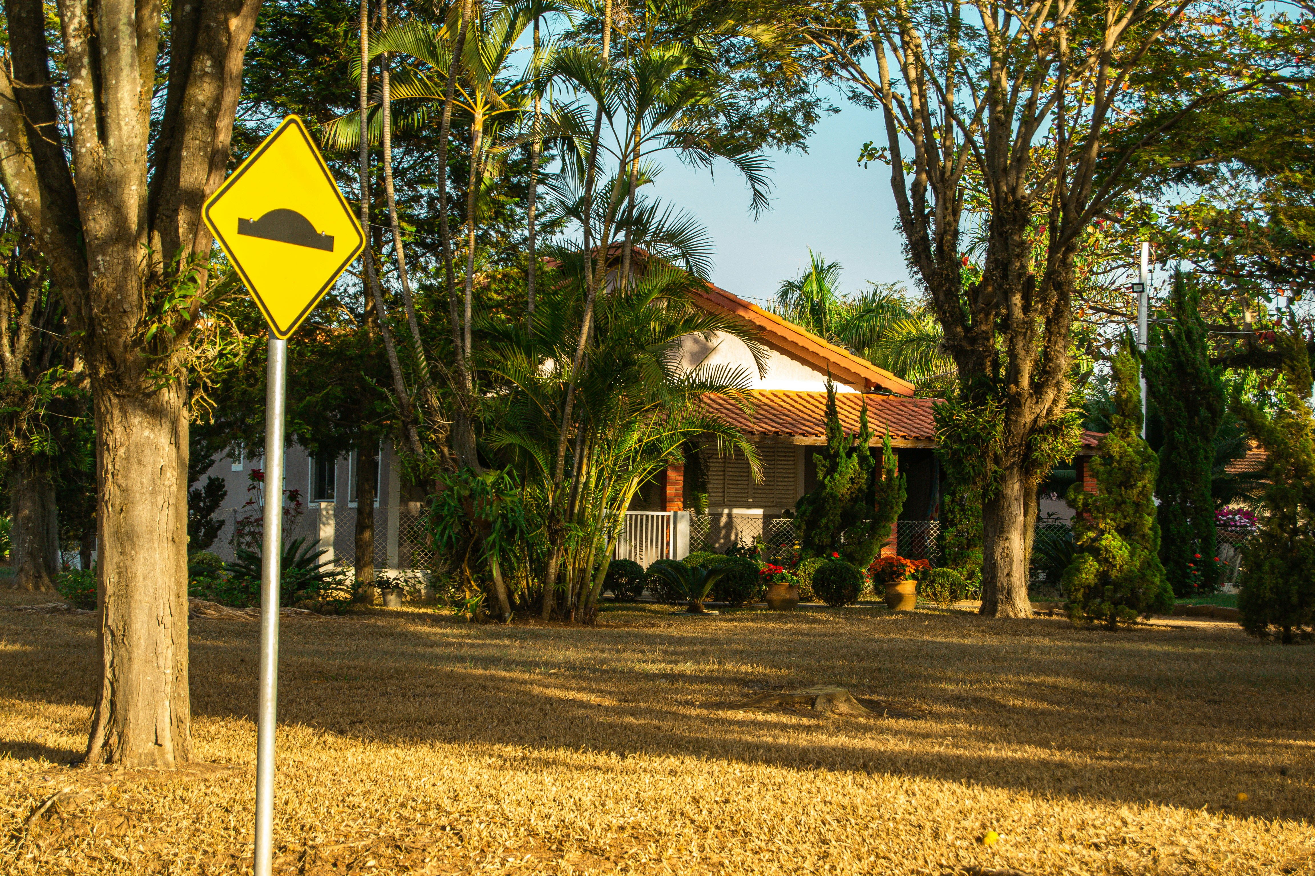 a house with a yellow sign