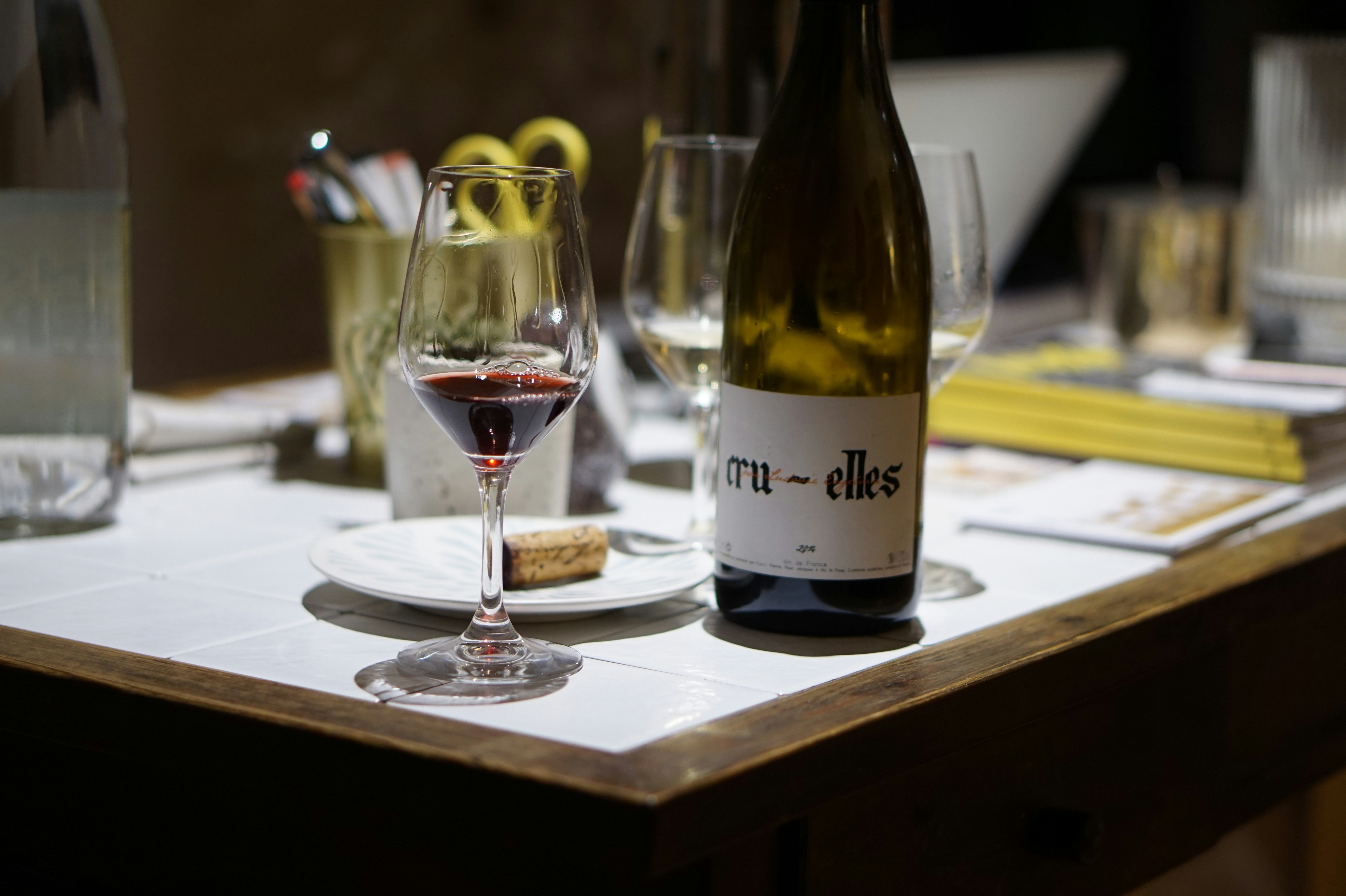 A bottle of wine next to a glass of wine photo – Free Red wine Image on ...