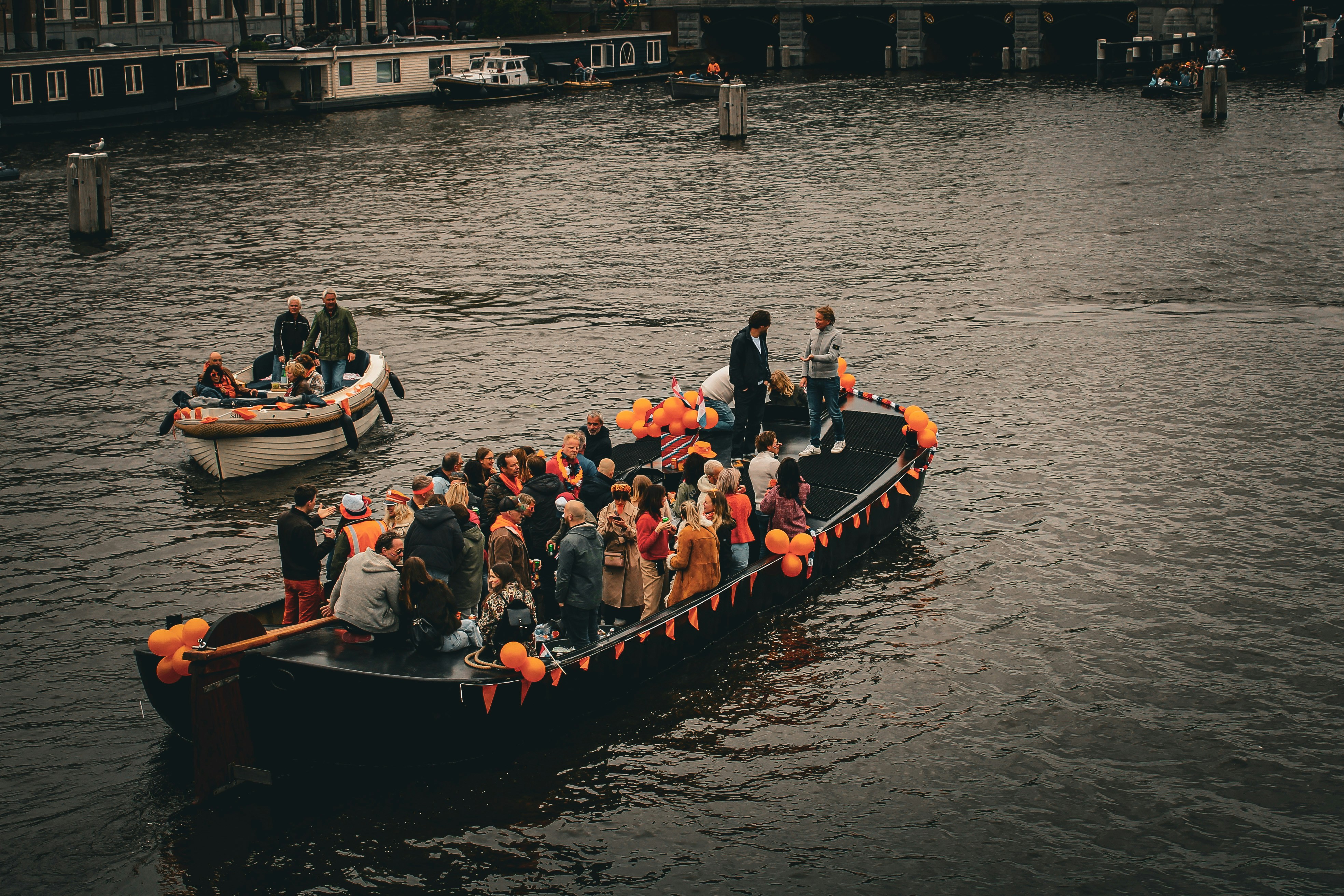 A group of people on boats photo – Free Boat Image on Unsplash