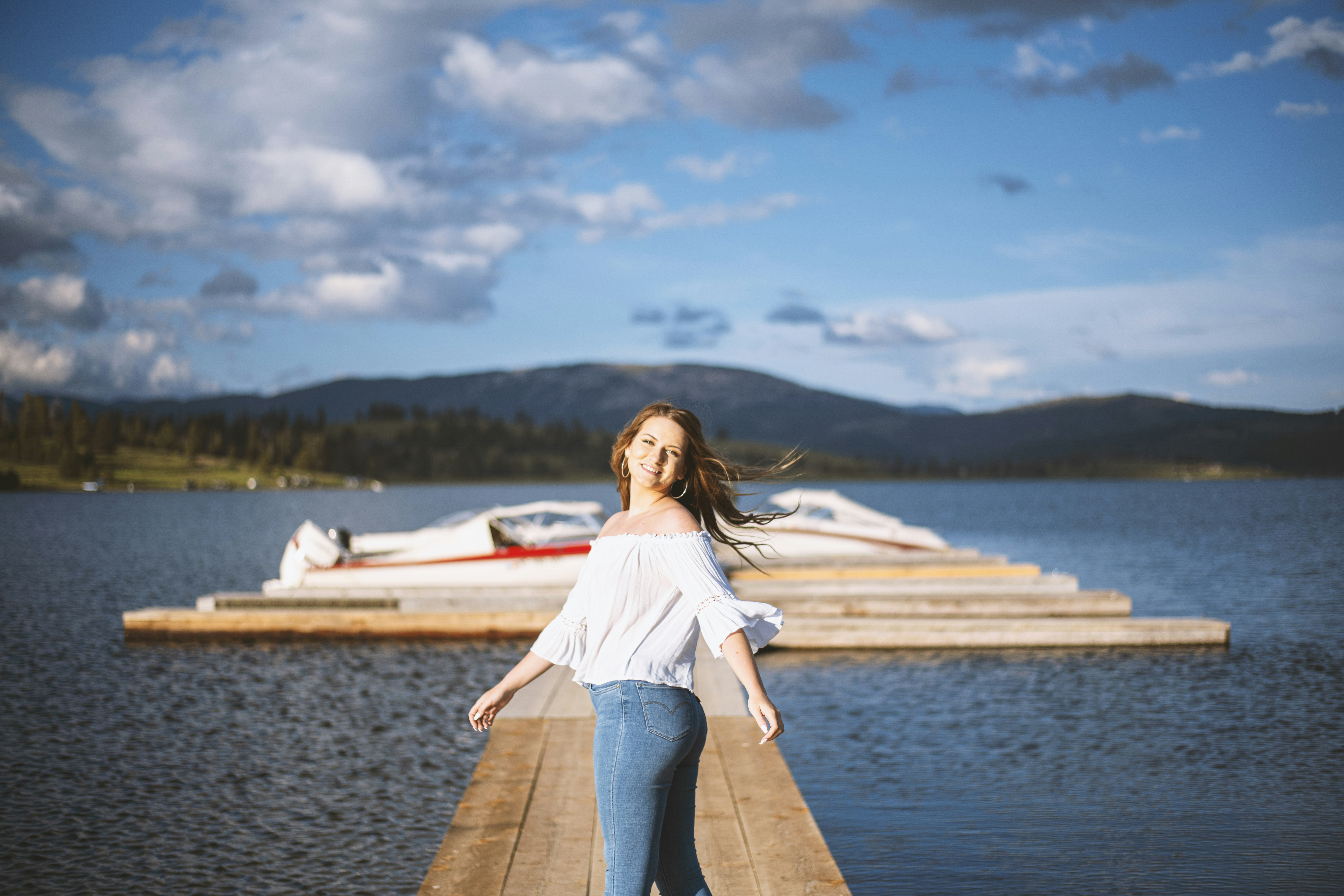 Standing on the Boardwalk: A Portrait by the Lake