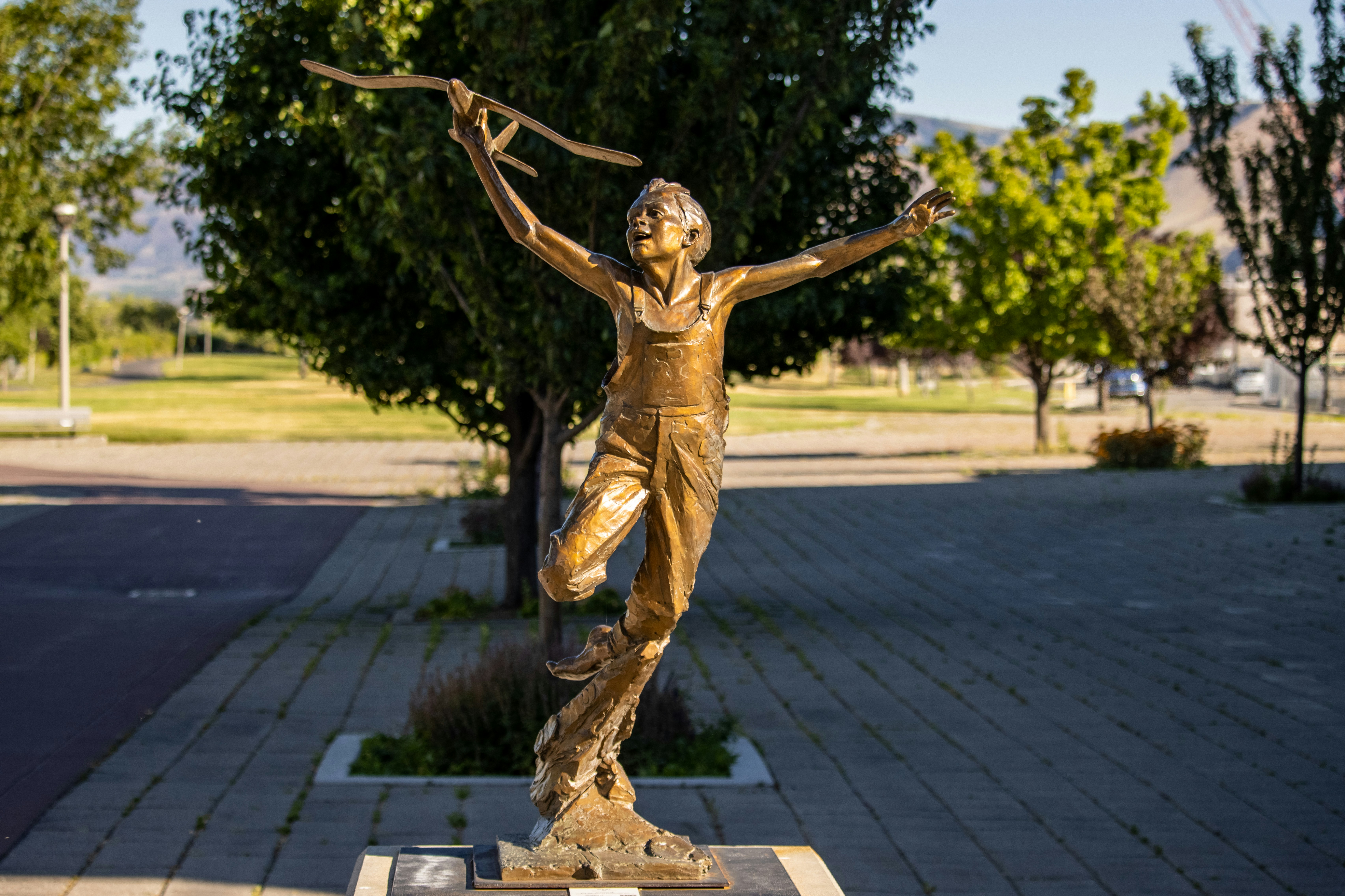 A statue of a person holding a cross photo – Free Wenatchee Image on ...