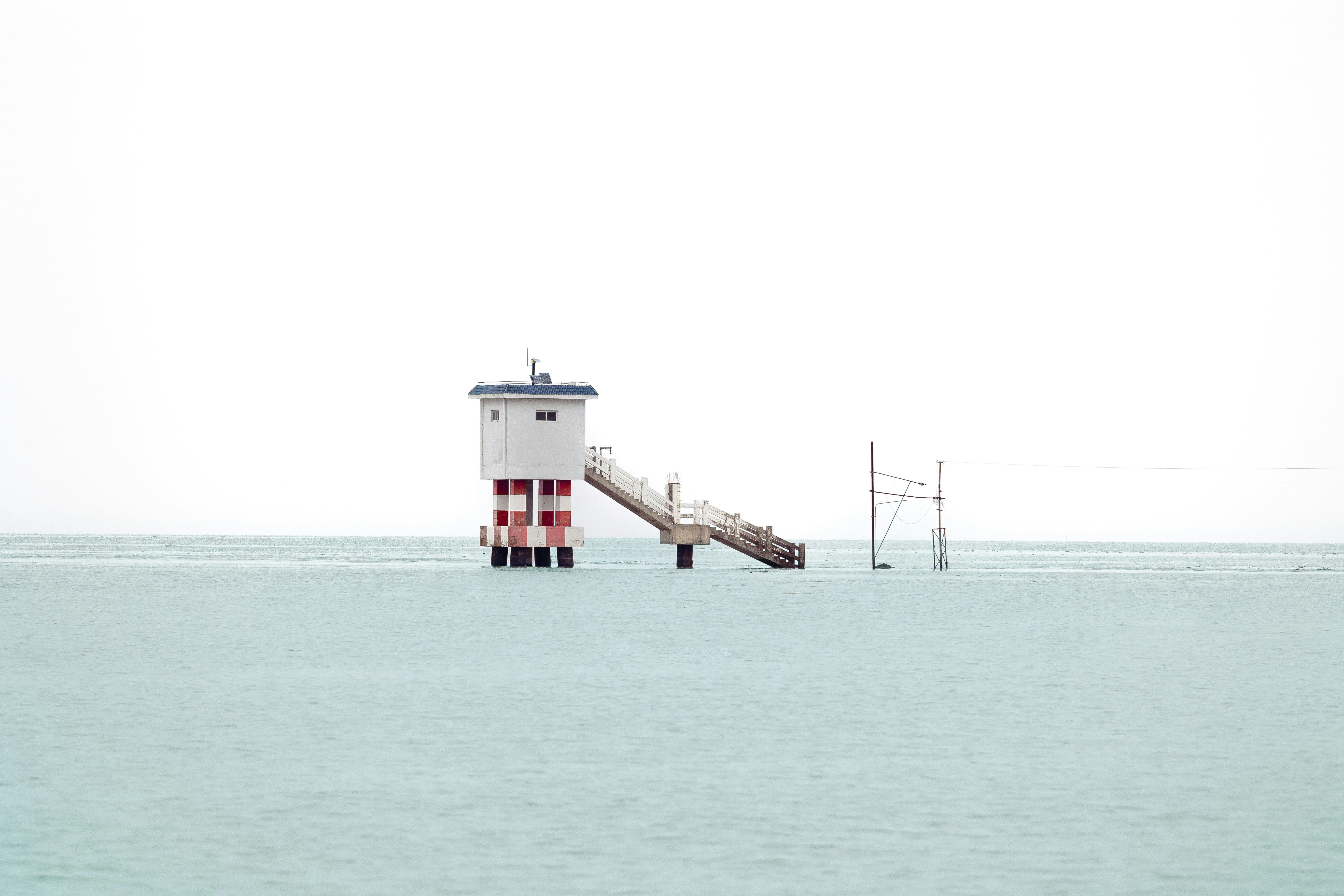 Lighthouse Stairway Over Calm Saltwater