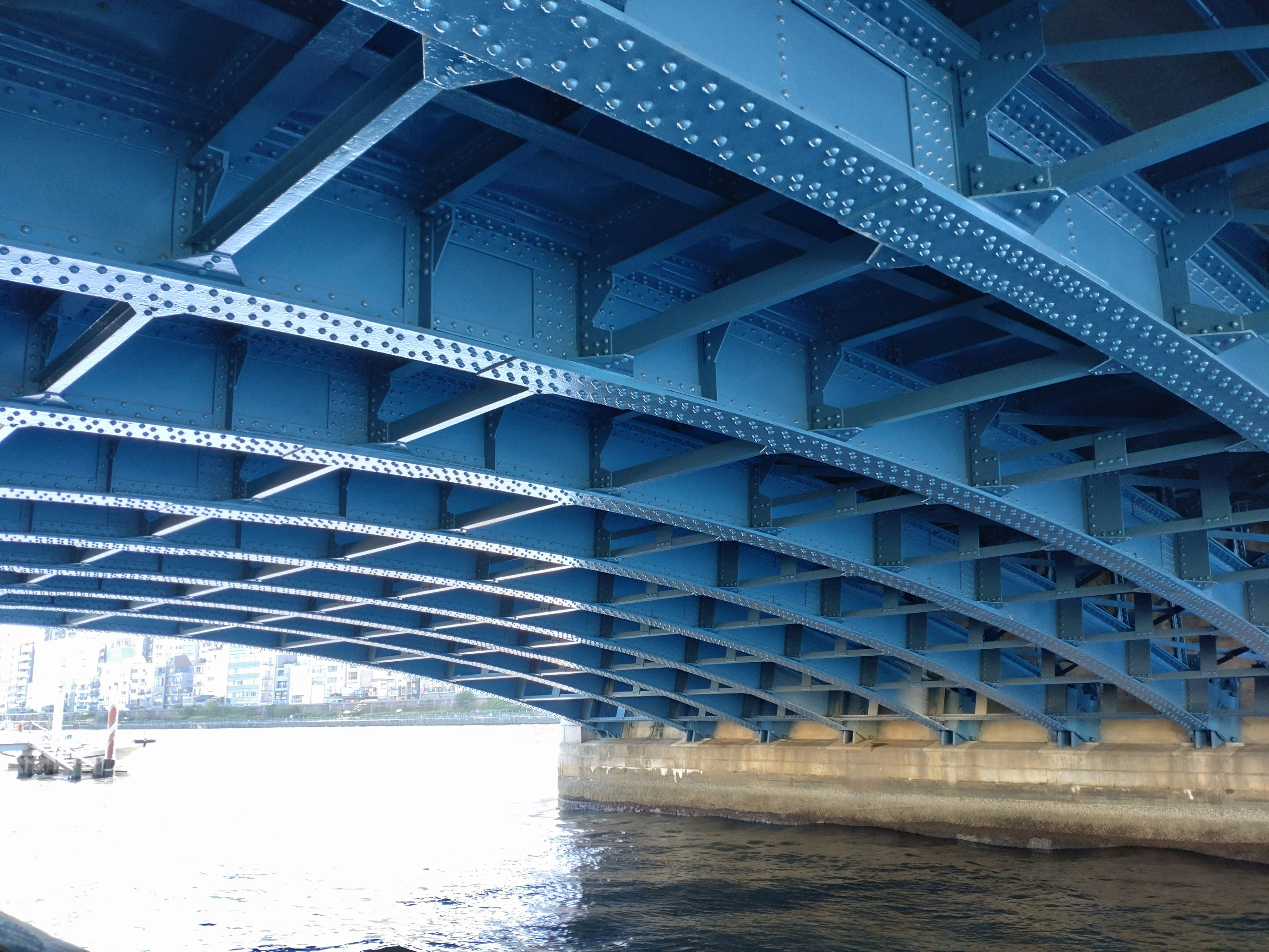 Blue Arches Over the River: A Study in Steel Geometry