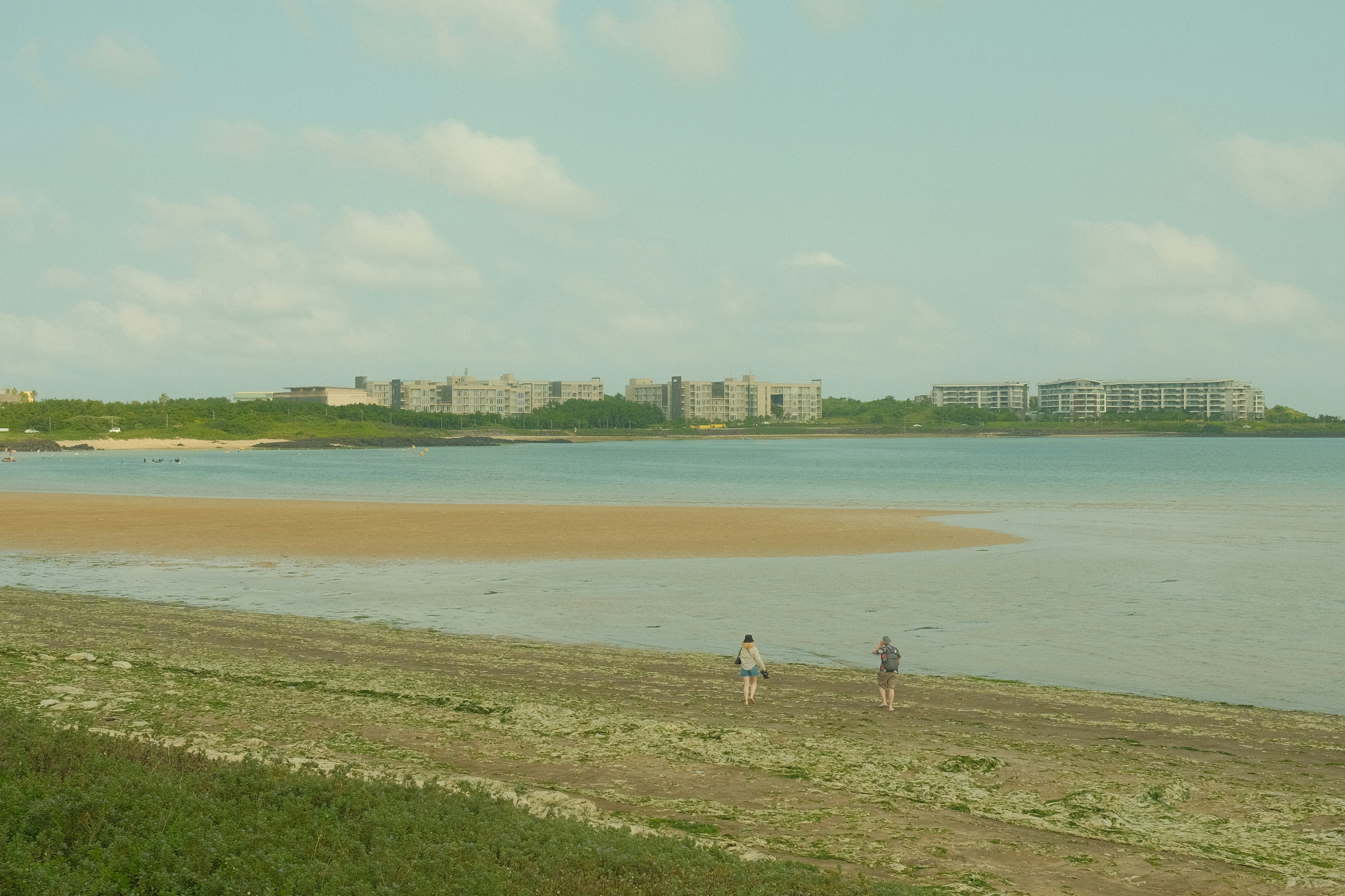a person walking on a beach