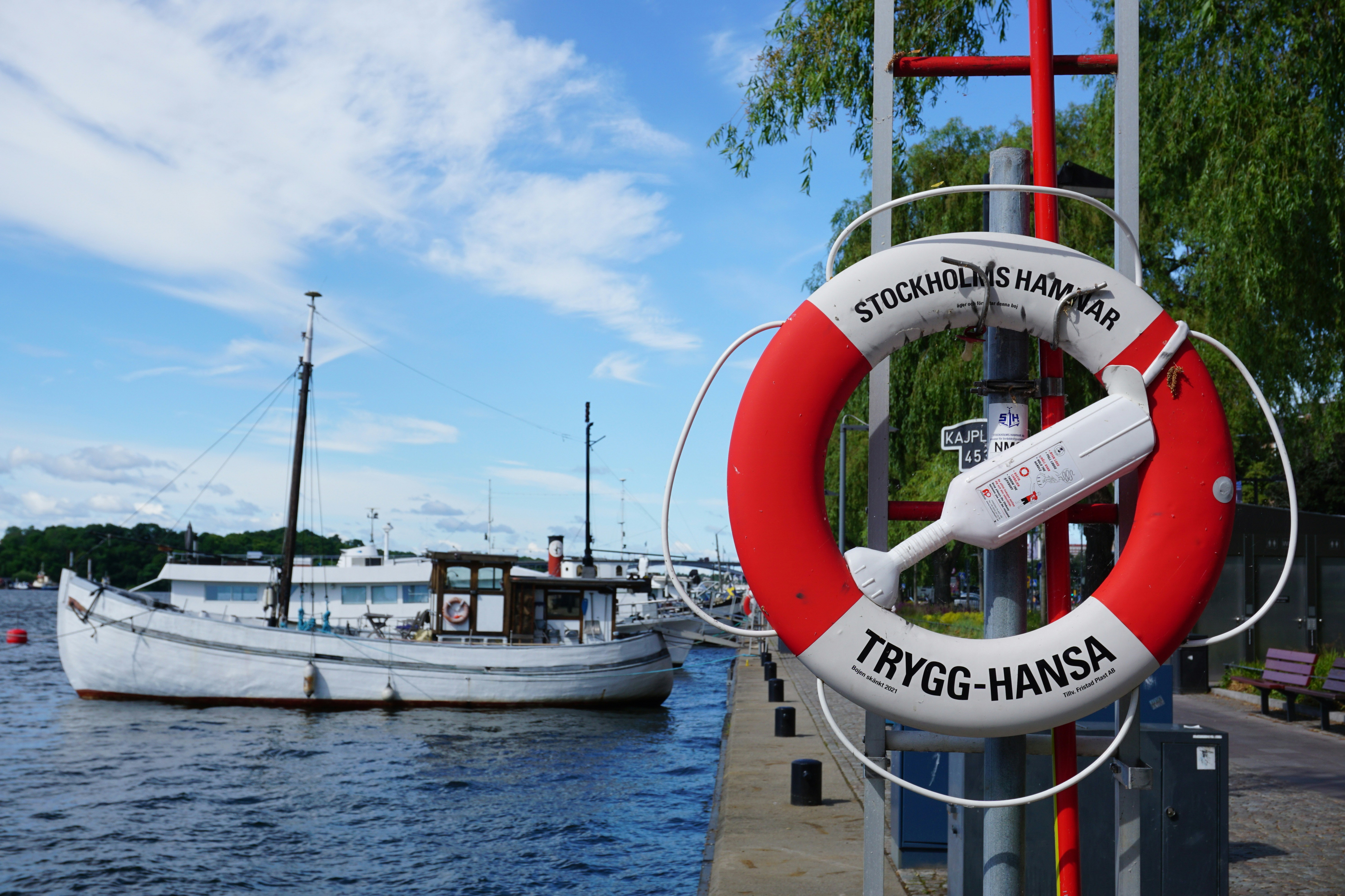 Stockholm Harbor Lifebuoy Framing a Quiet Baltic Moment