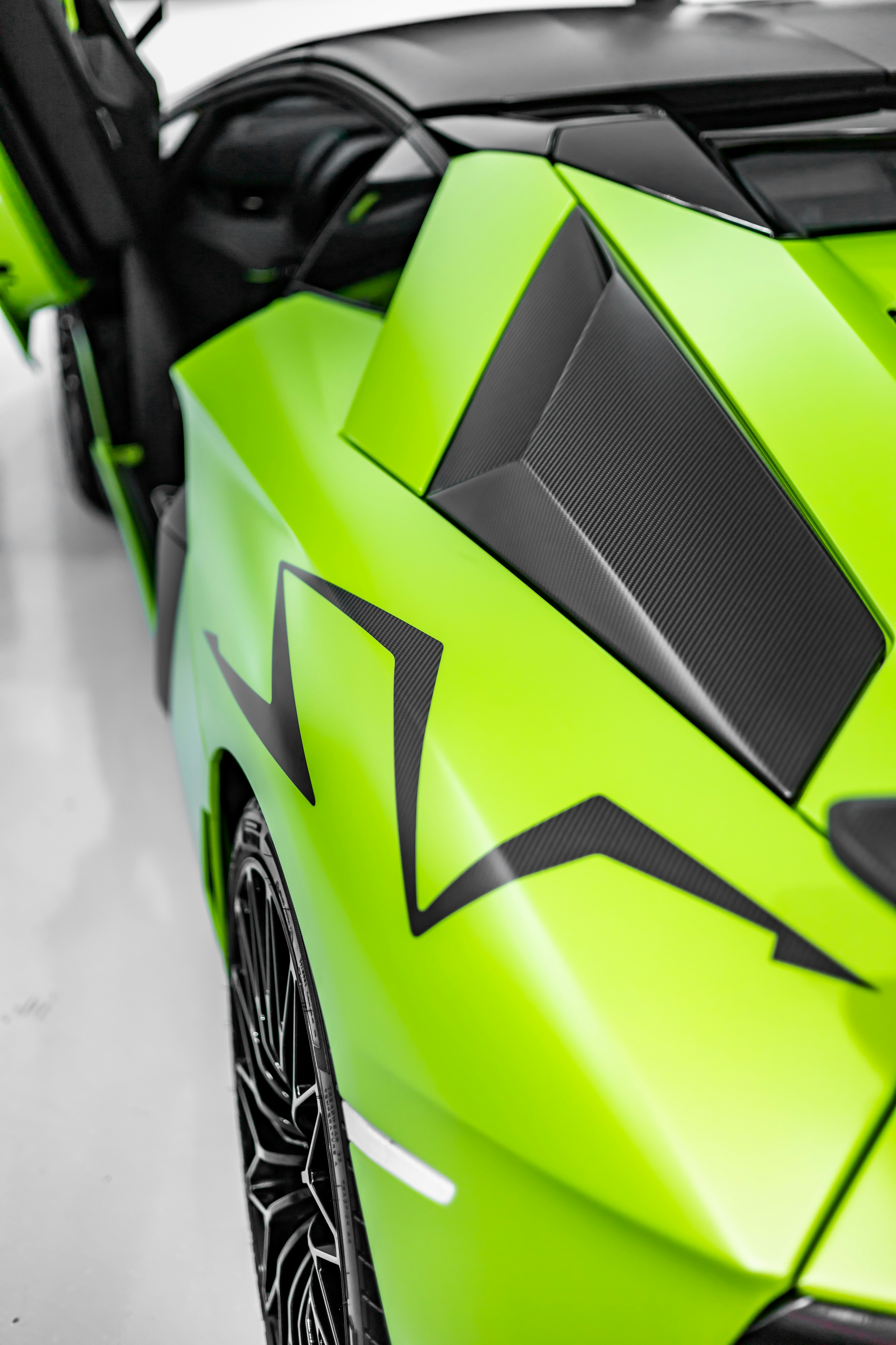 A close up of a green car photo – Free Green Image on Unsplash