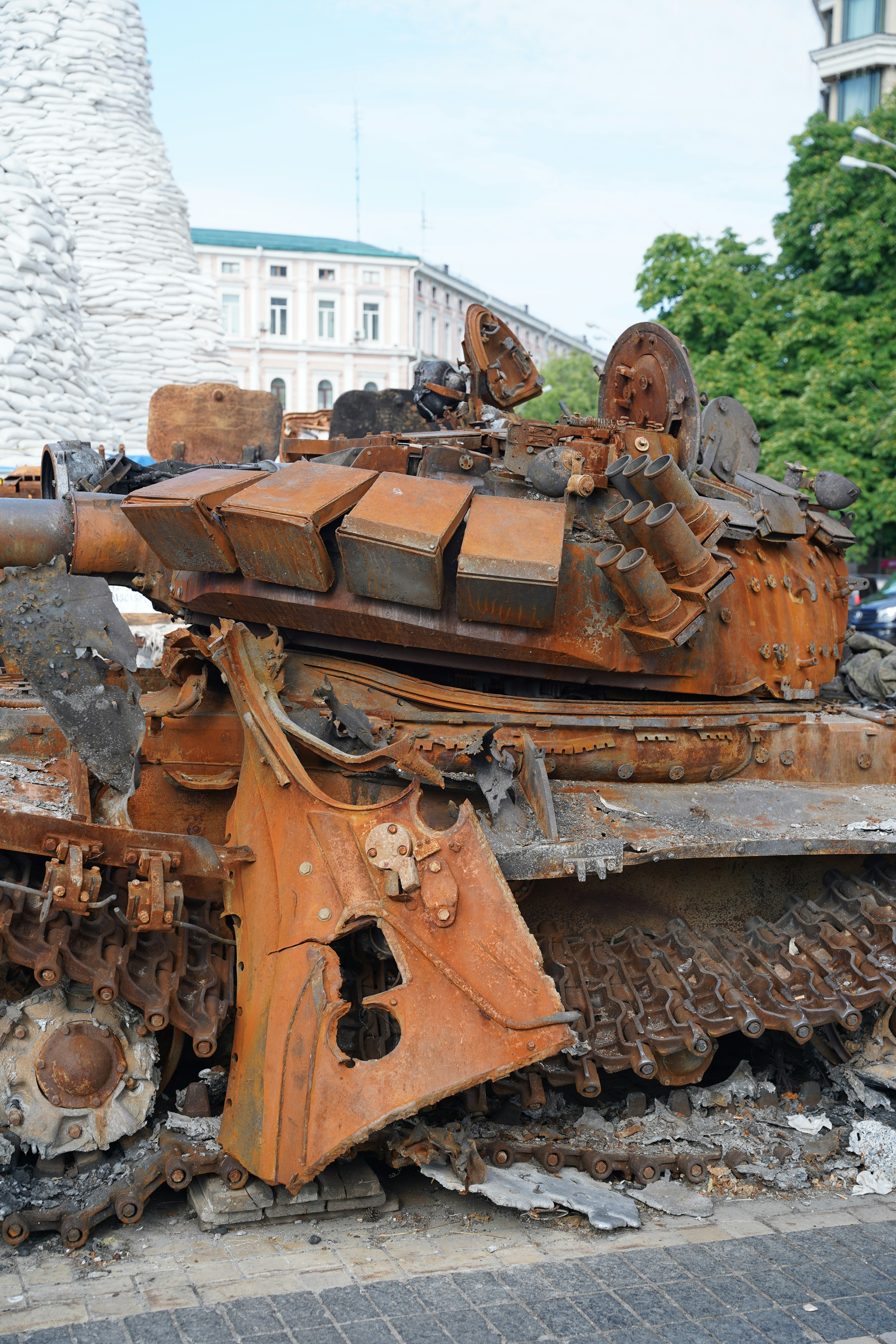 A rusted out tank on a street photo – Free Kyiv Image on Unsplash