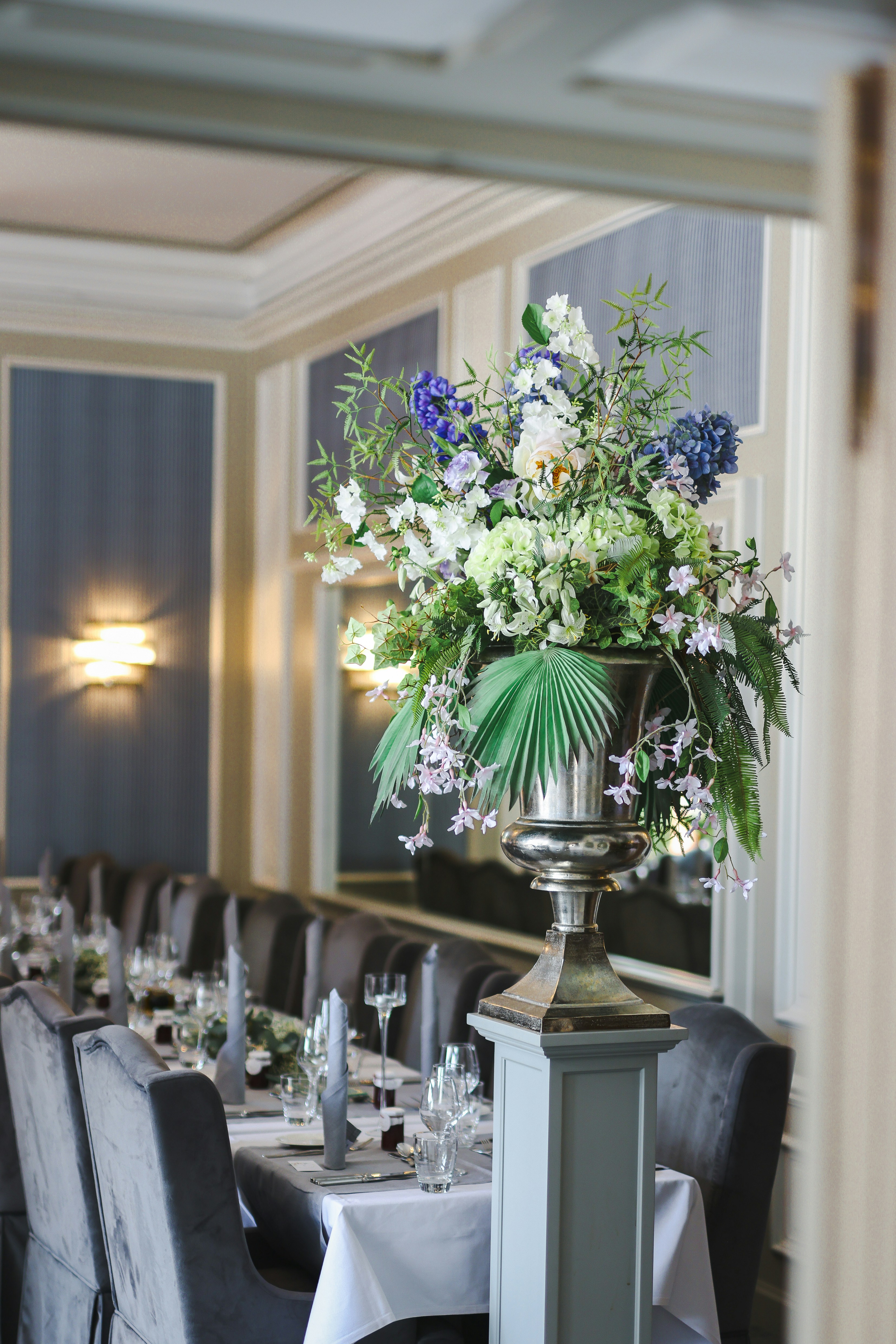 a vase of flowers on a table