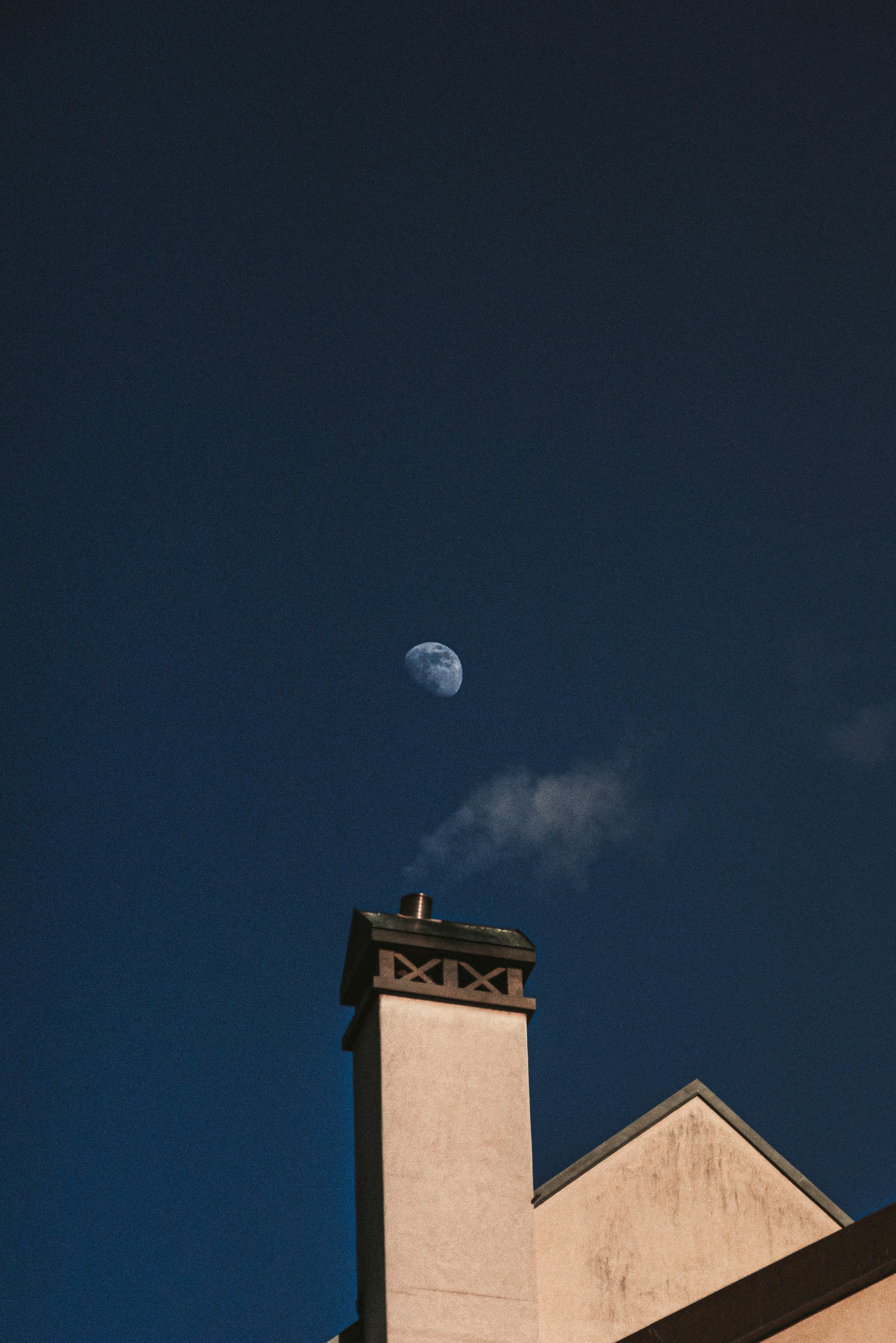 Moon Above the Rooftop Chimney: A Quiet Nightscape