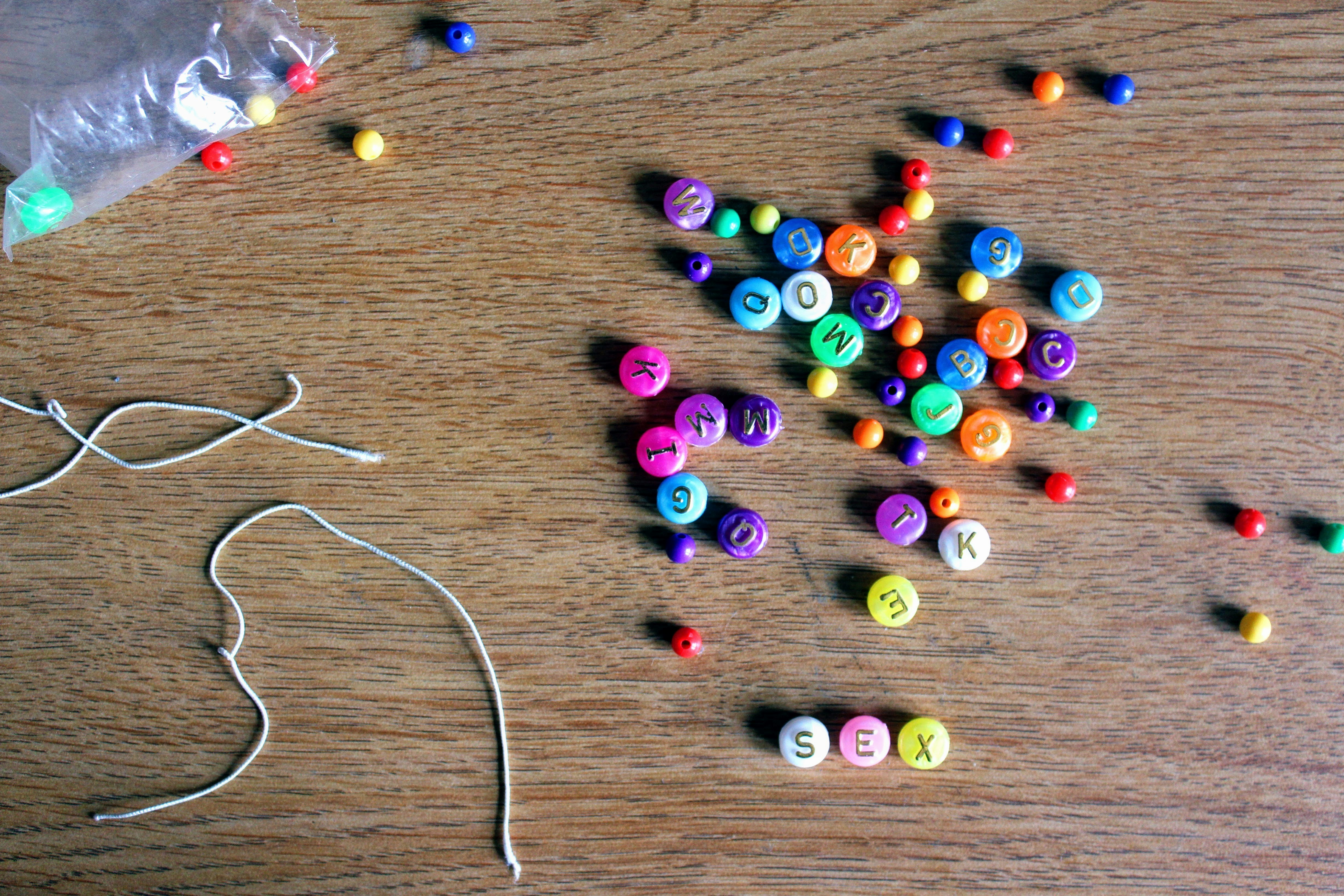A necklace with colorful beads photo – Free Craft Image on Unsplash
