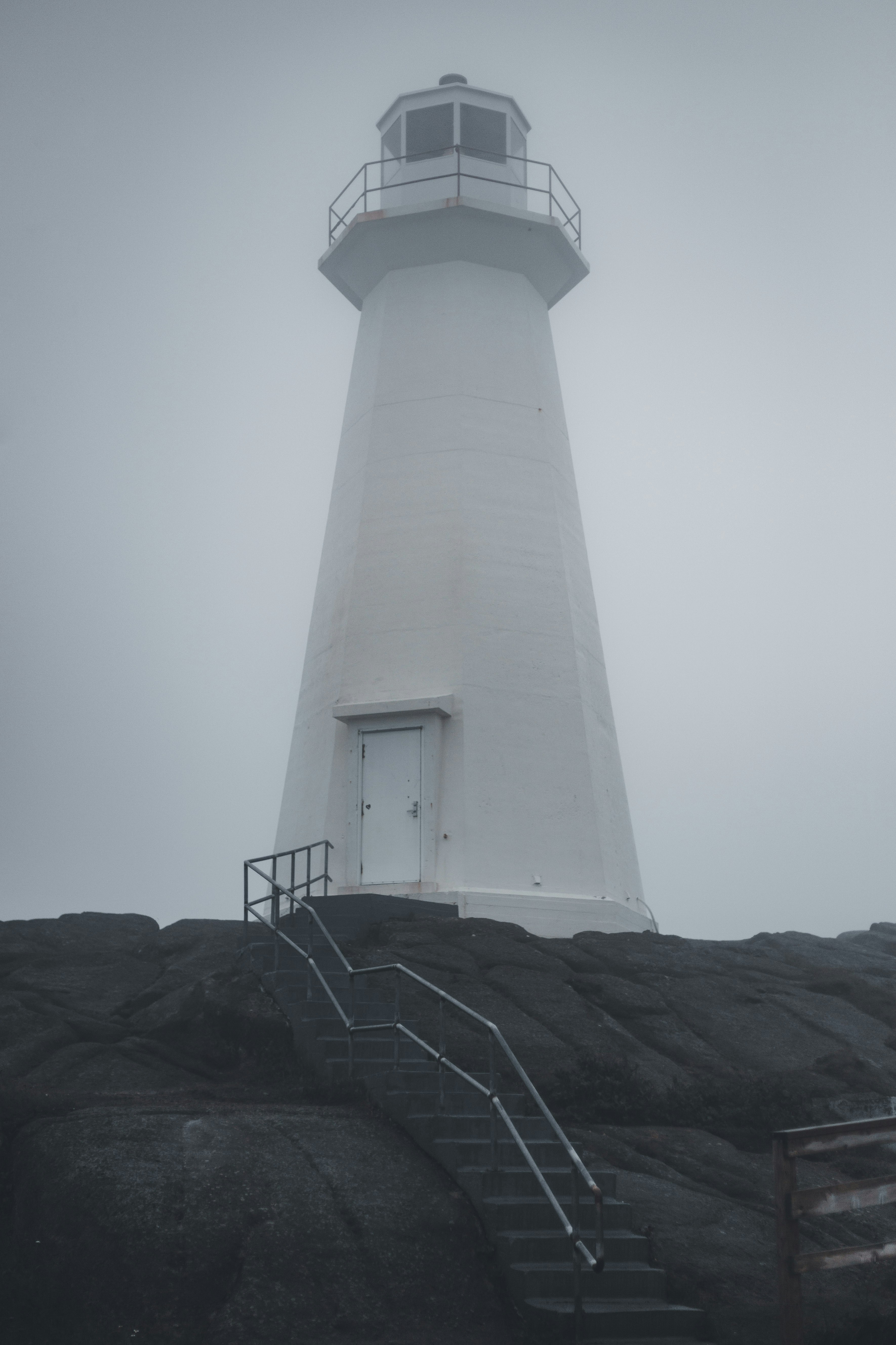 A lighthouse on a hill photo – Free Grey Image on Unsplash