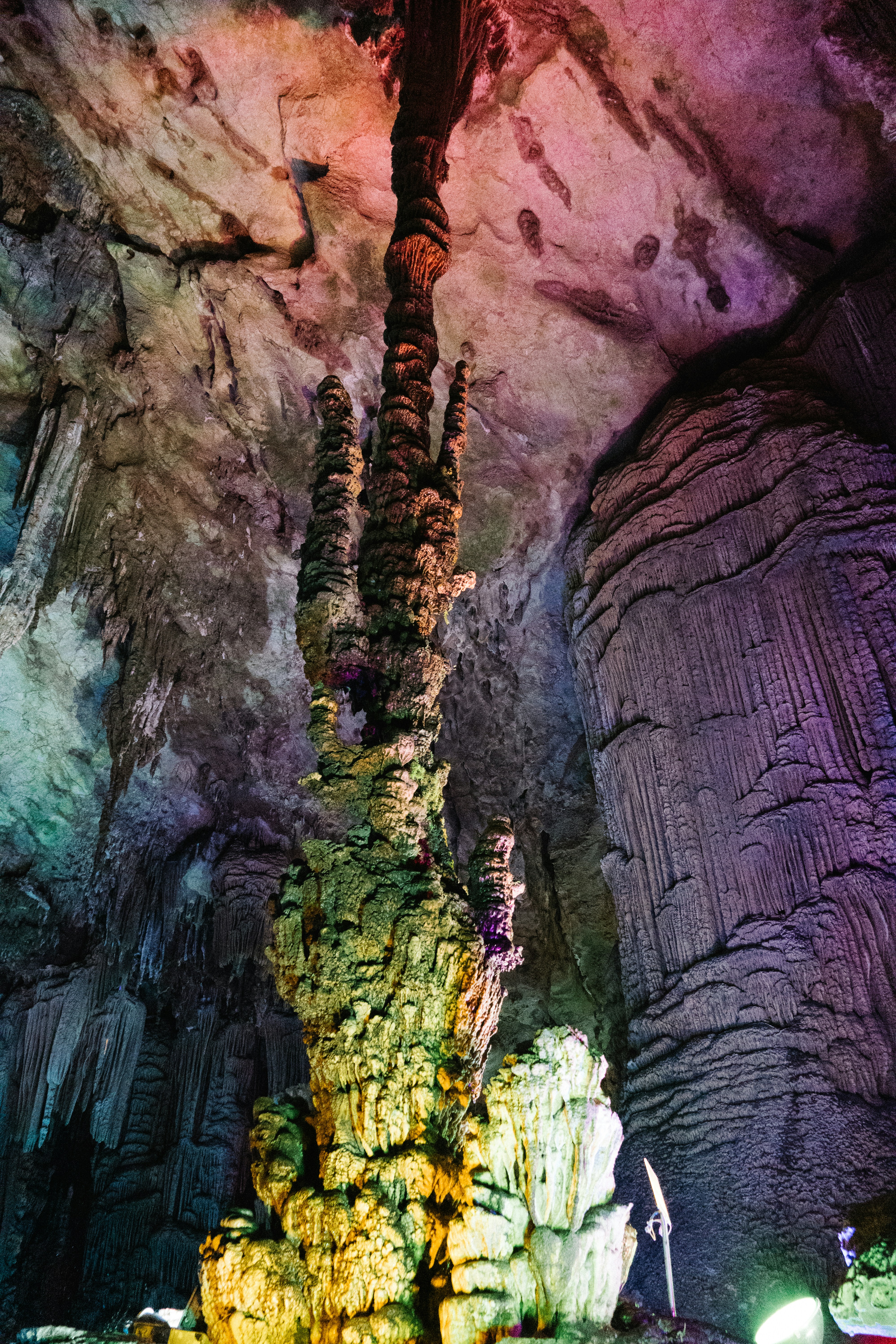 Luminous Stalactites: Colorful Cathedral of the Cave