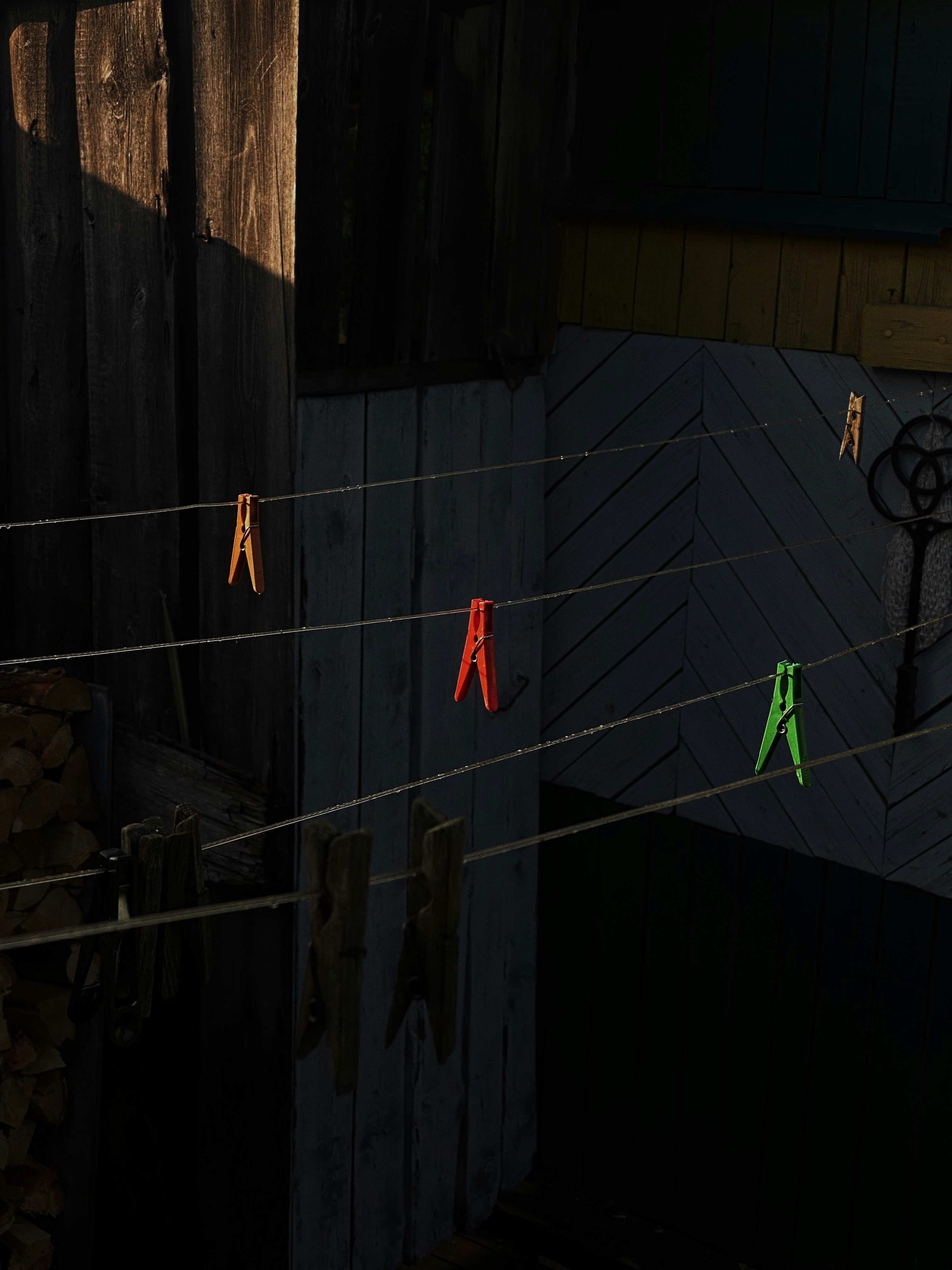a group of colorful objects from a wire fence