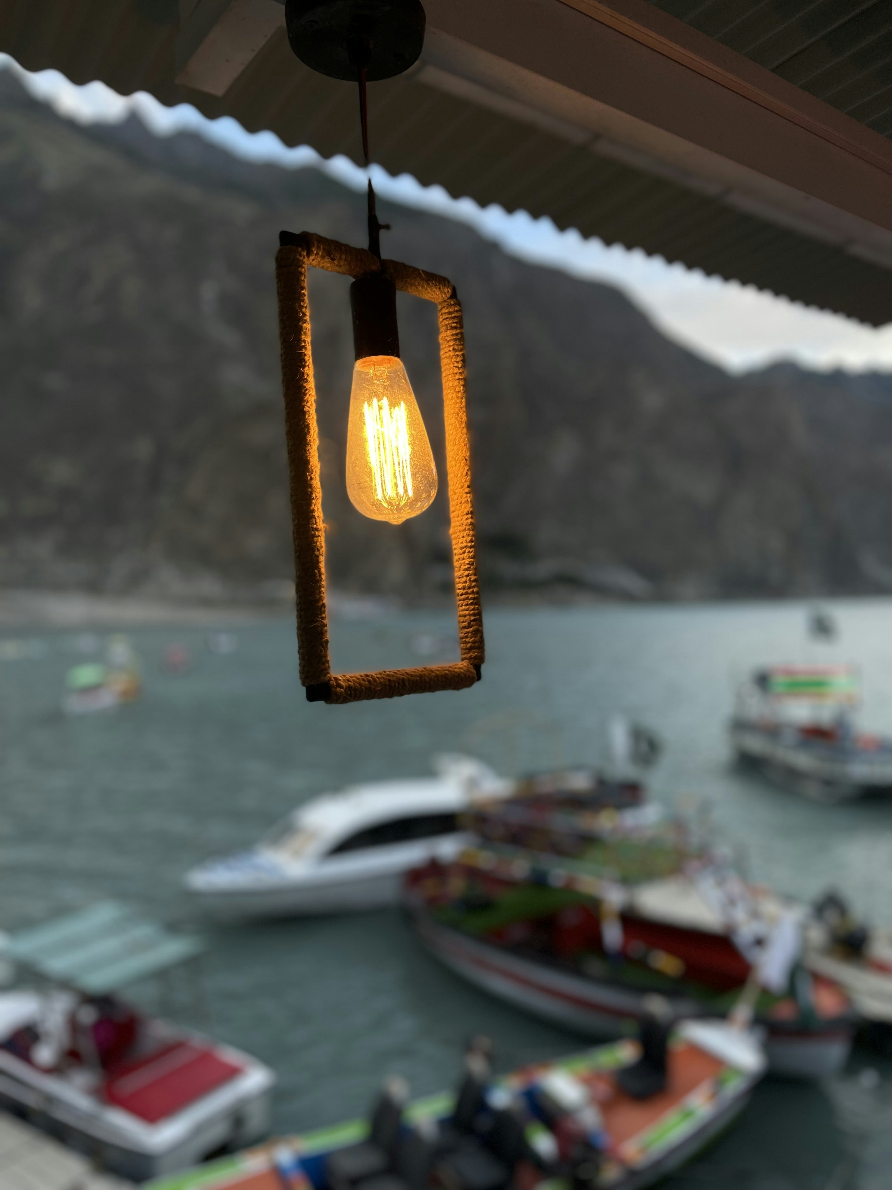 Hanging Edison: a Warm Glow Over a Seaside Boatfront