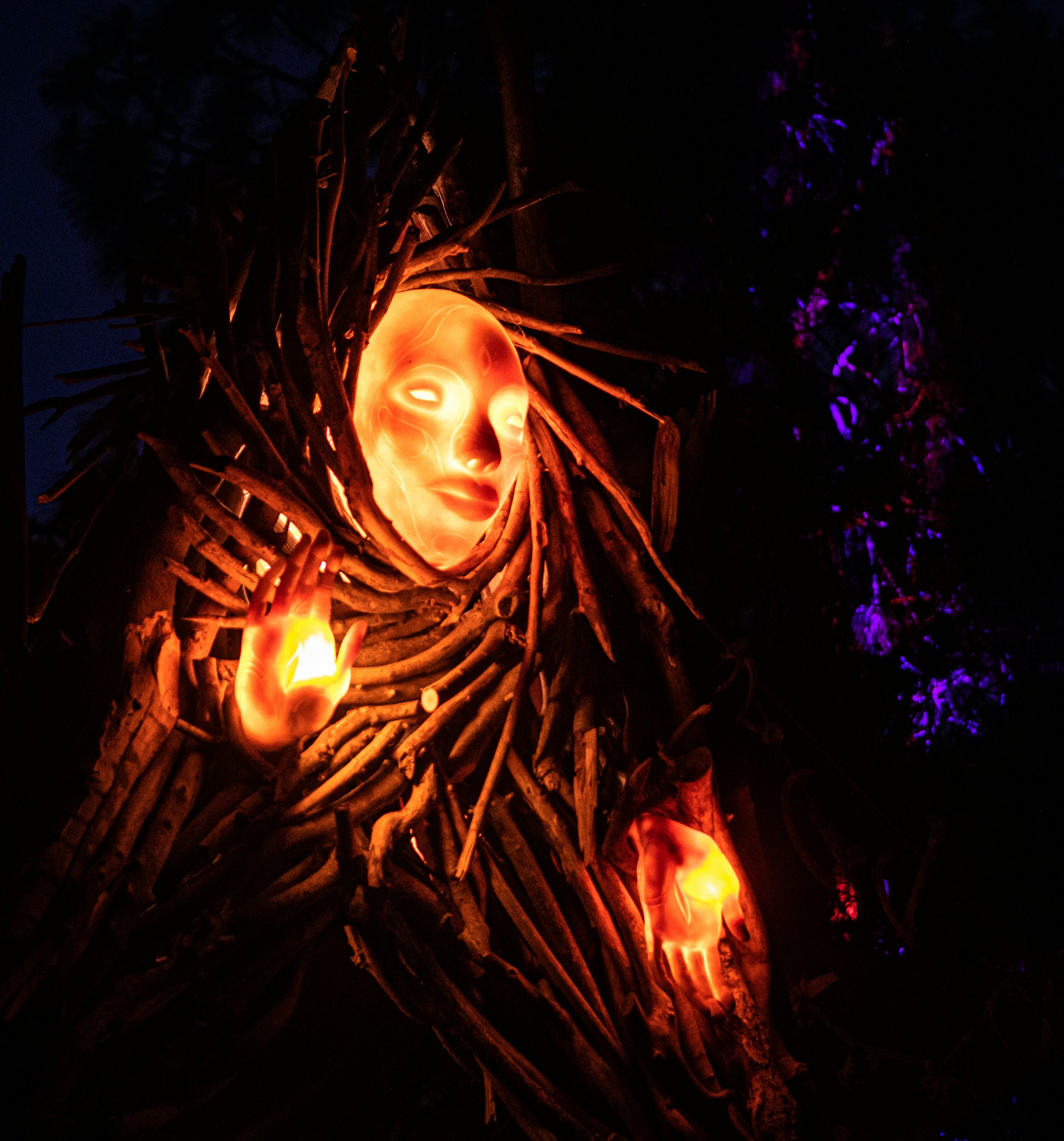 Lanterned Figure in Charred Wood: An Ember-Sculpted Vigil