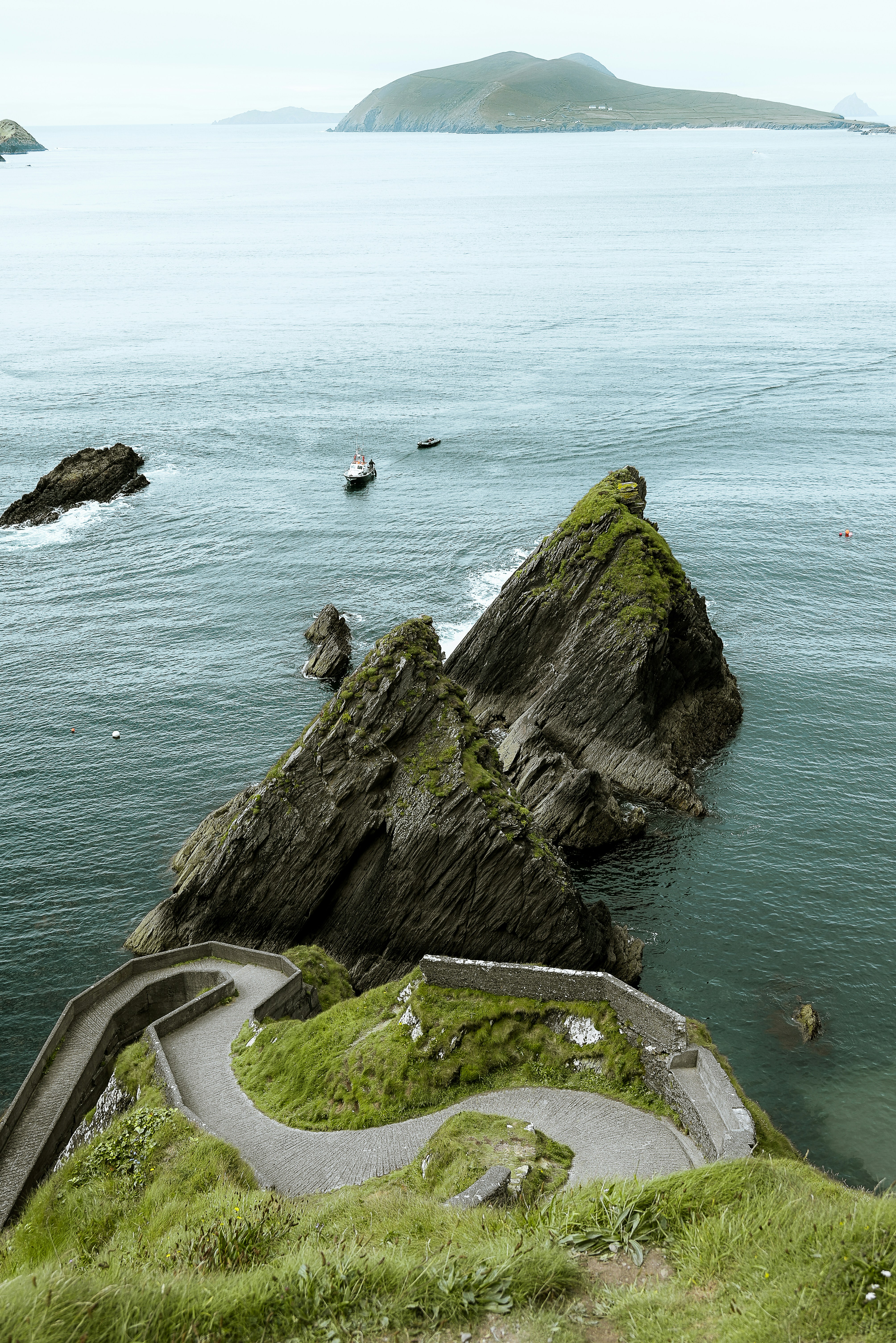 Mossy Promontory Staircase: A Coastal Ascent Toward the Quiet Horizon