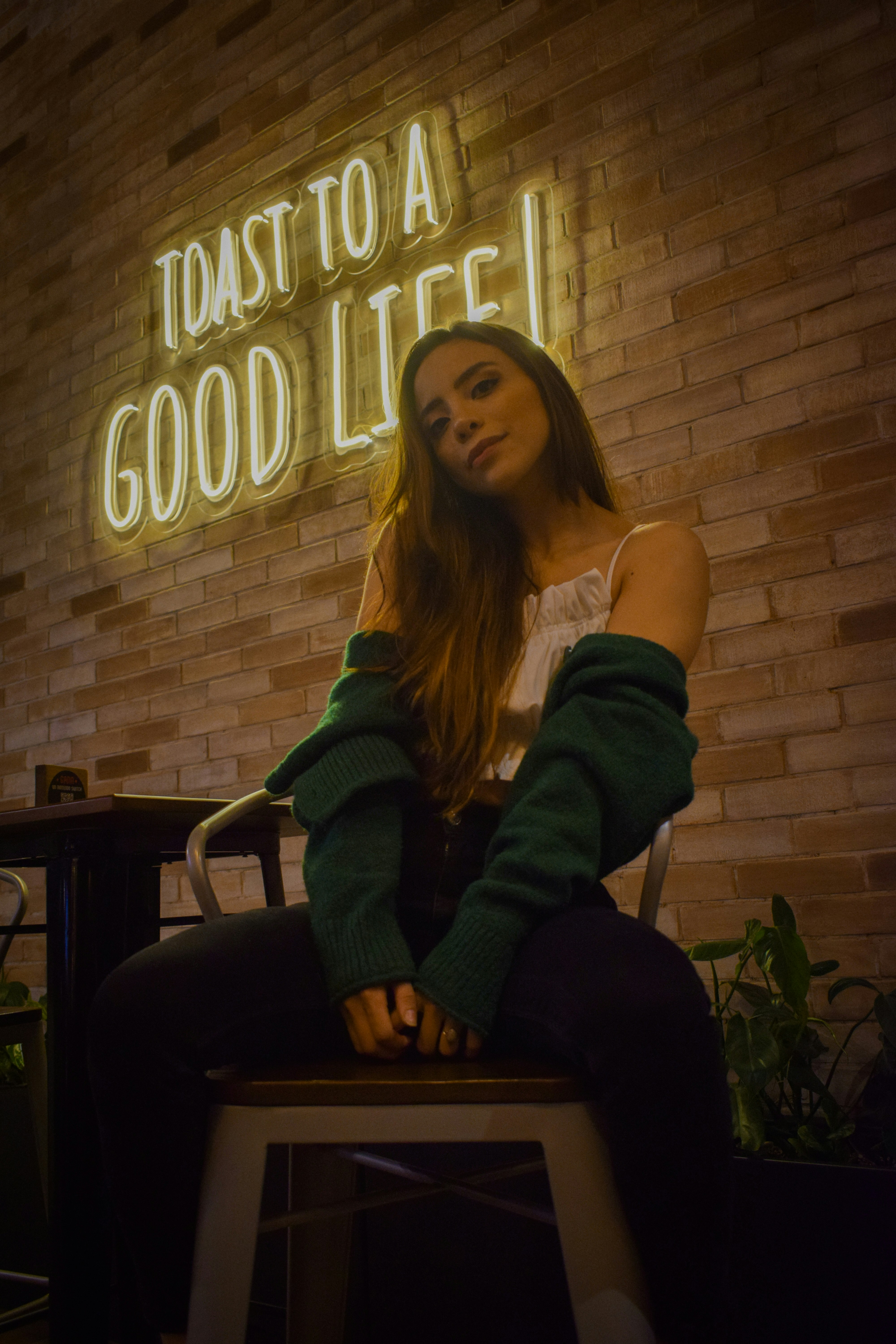 Neon Portrait Under Warm Brick Lights