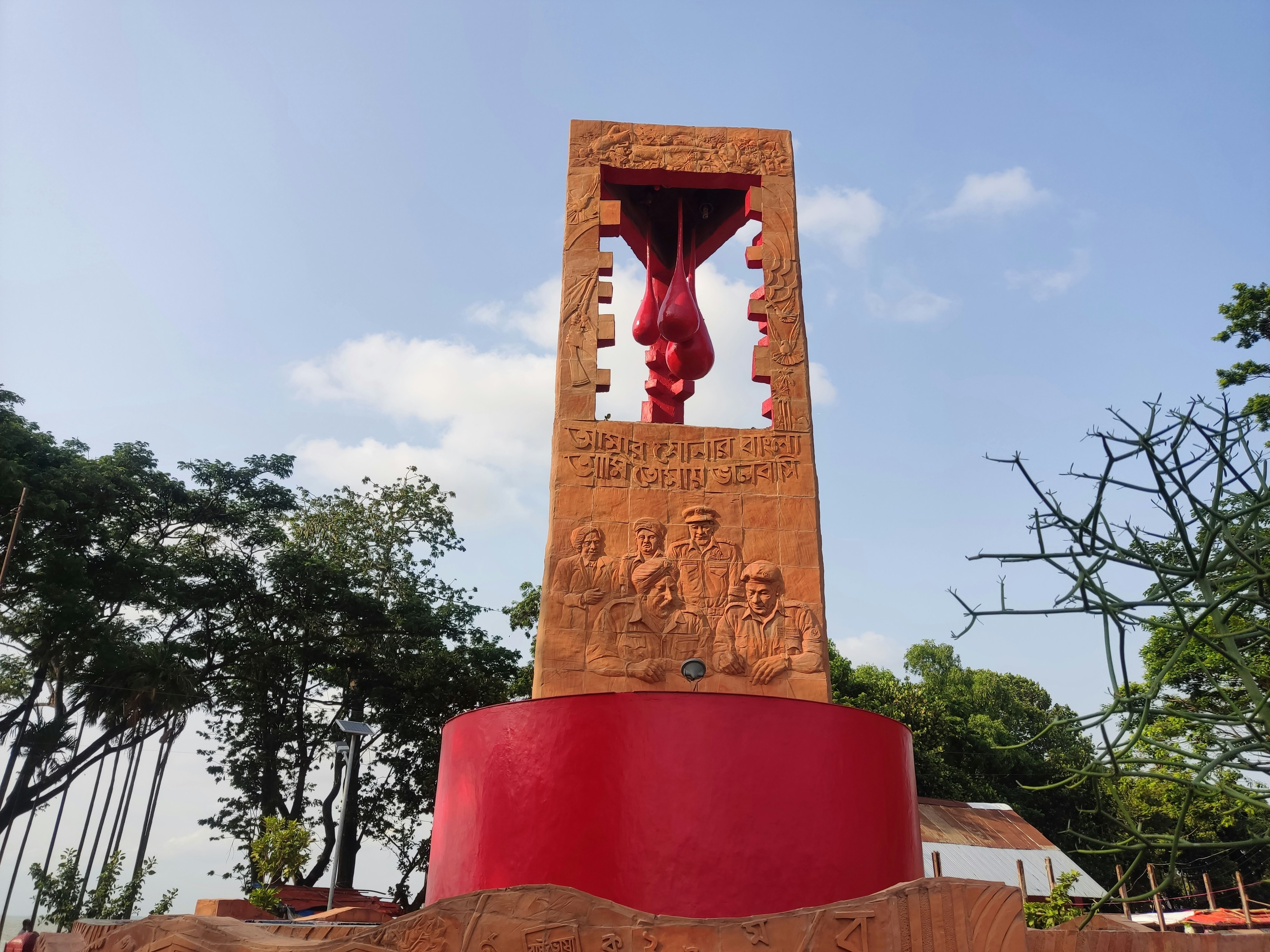 Crimson Figure Framed in Stone: Monument at Noon