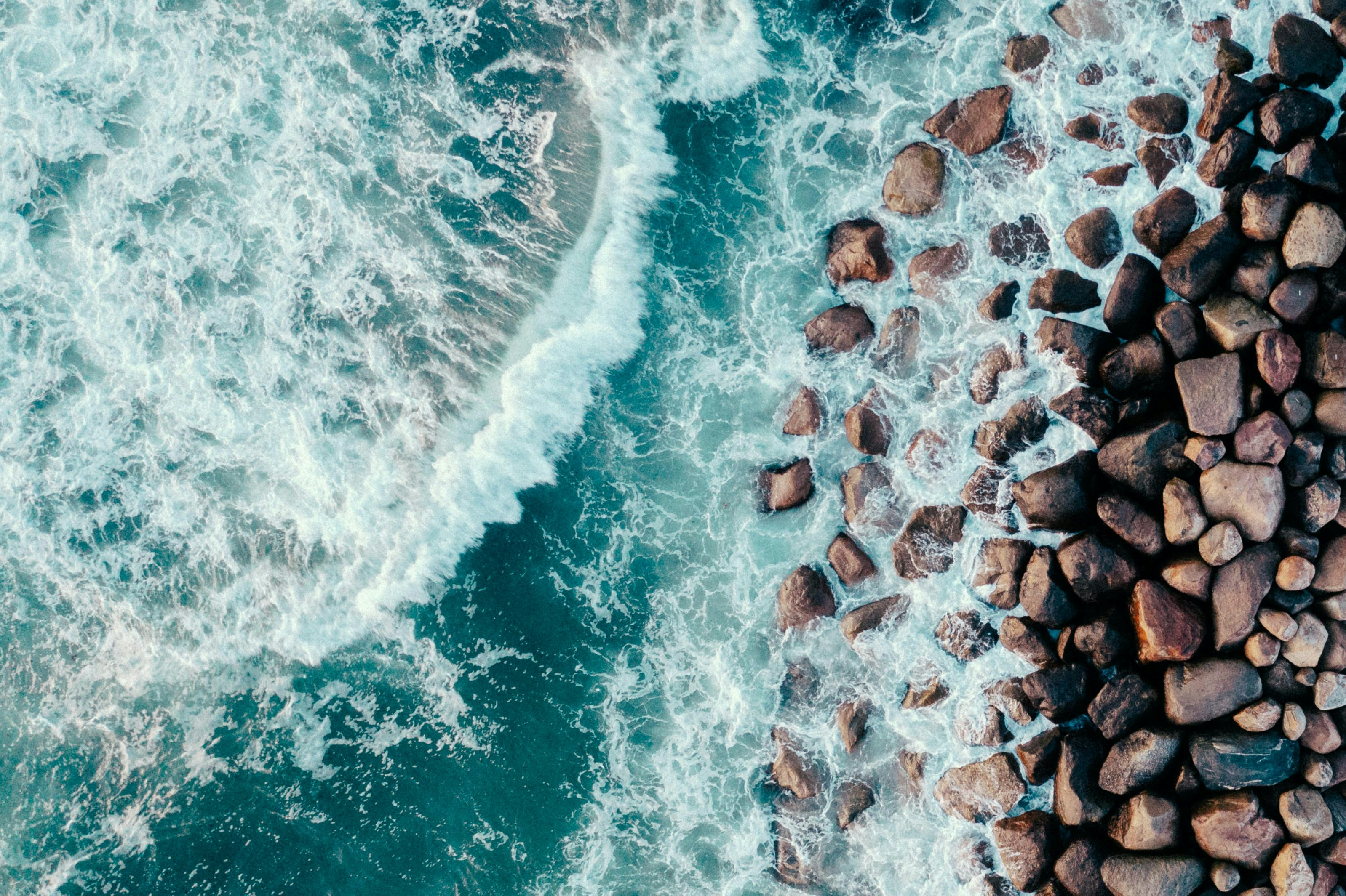 Foam-Line Convergence: Waves Meet the Granite Edge