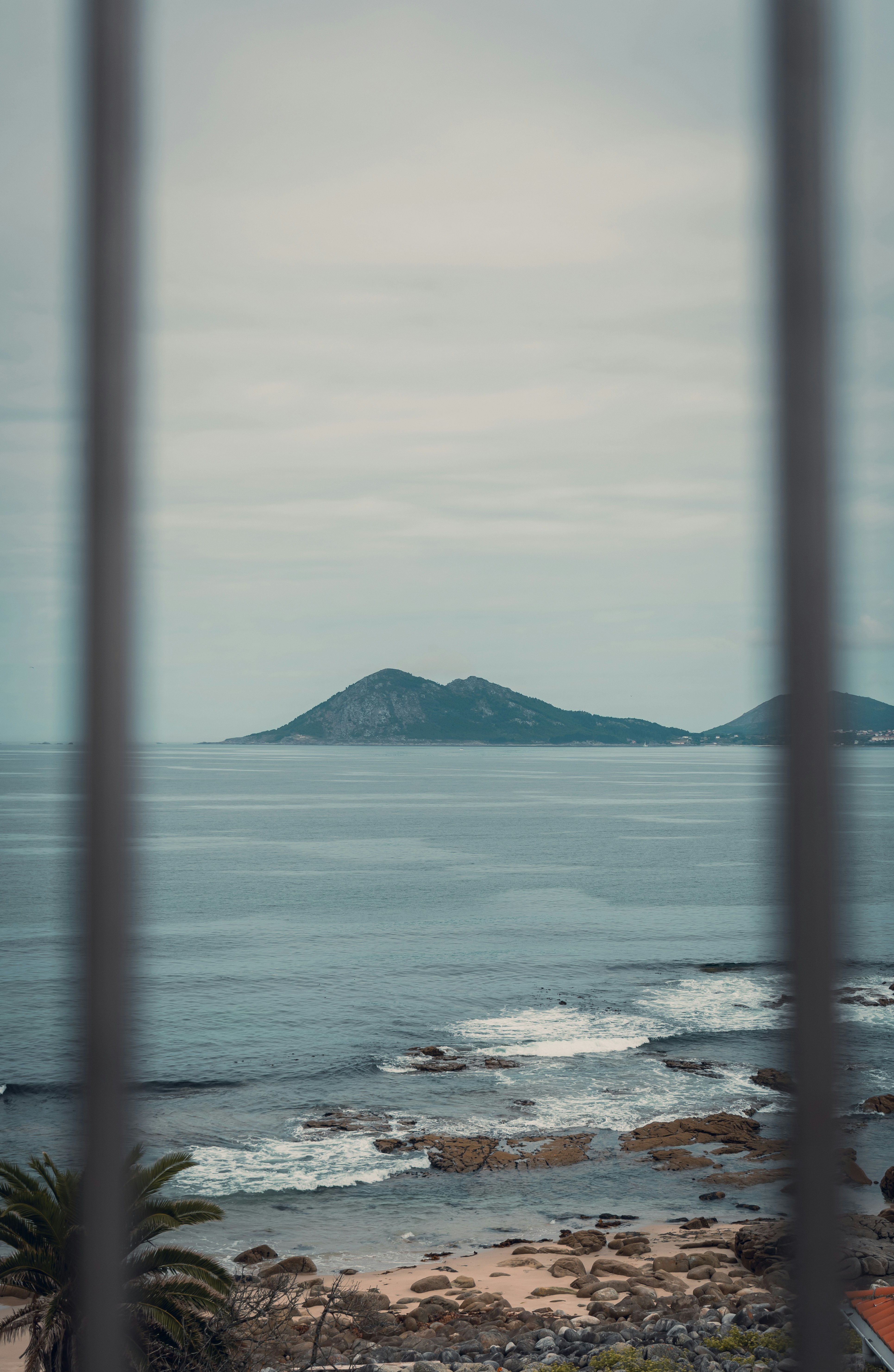 Horizon Framed by Rails: Seascape Between Bar Gaps
