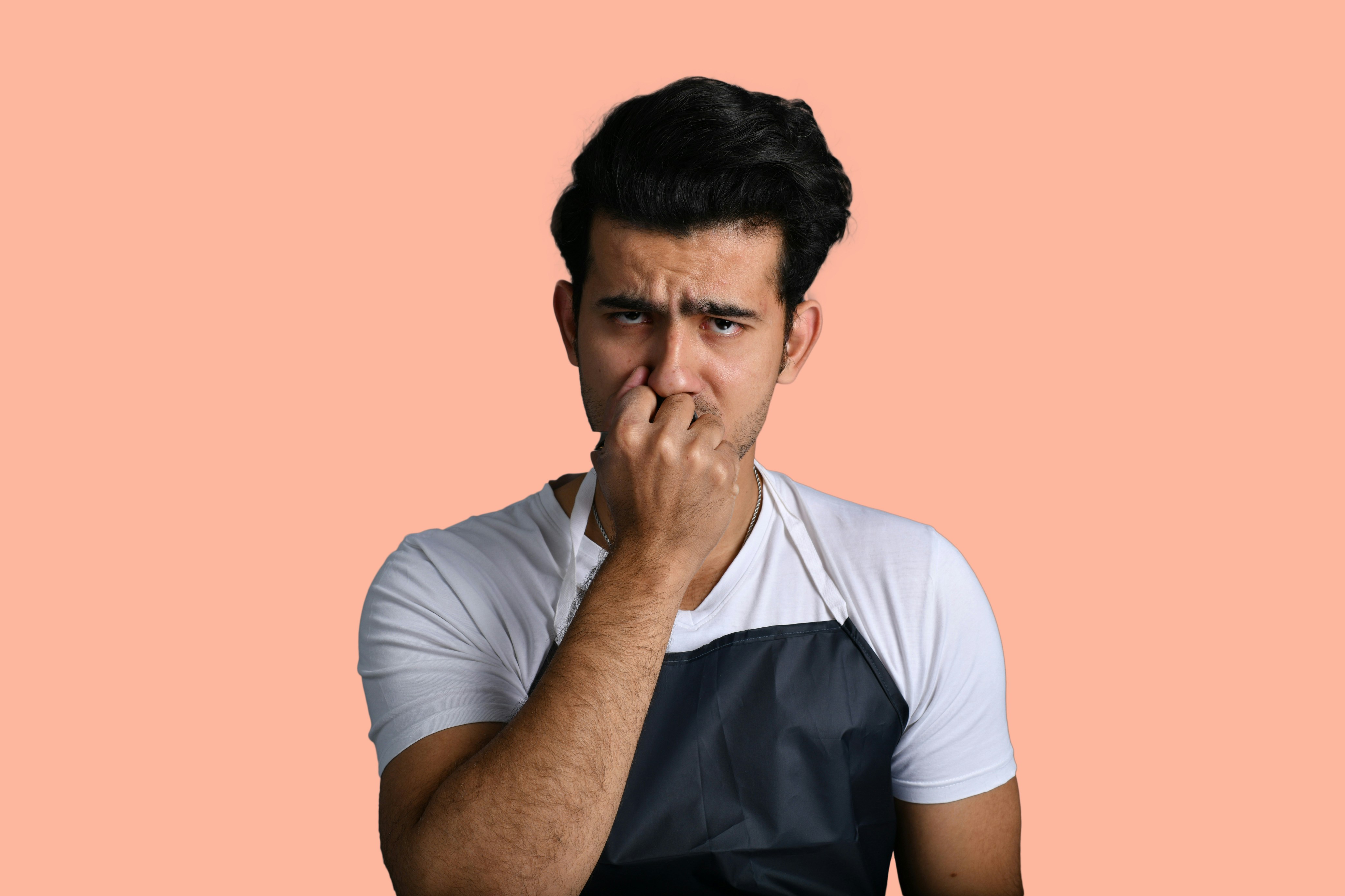 A man with his hand on his chin photo – Free Person Image on Unsplash