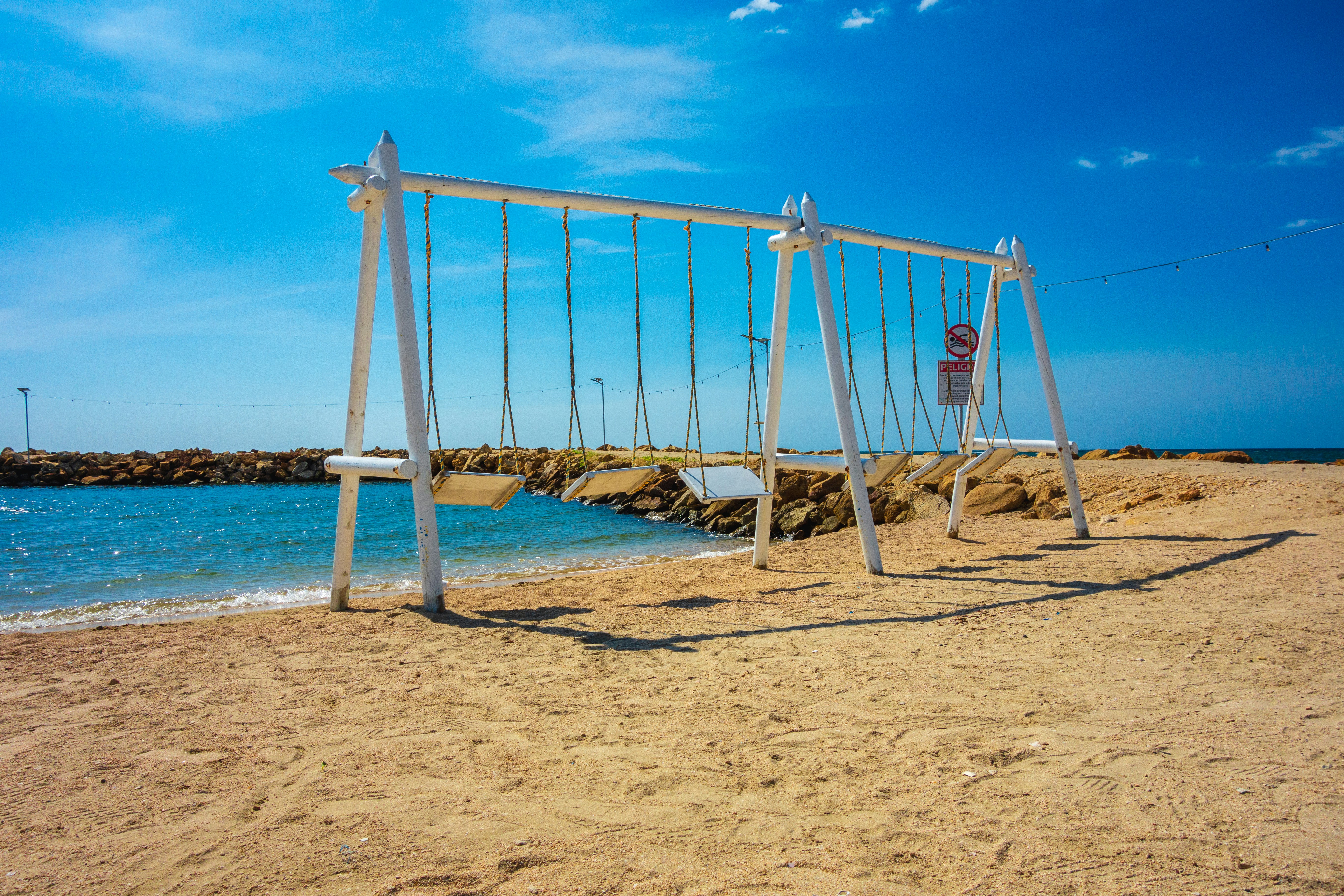 A structure on the beach photo – Free Blue Image on Unsplash