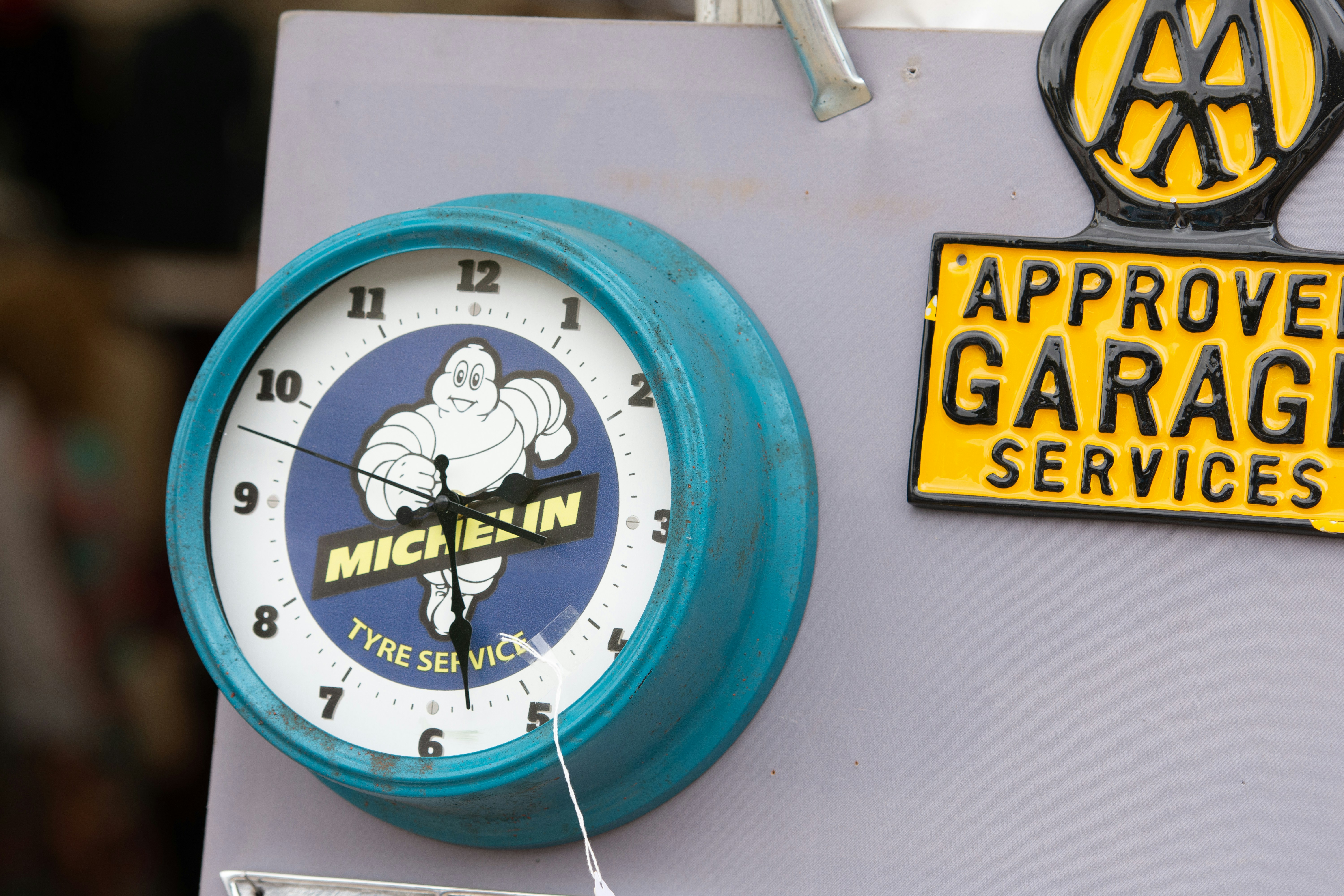 Michelin Clock at a Sunny Auto Garage